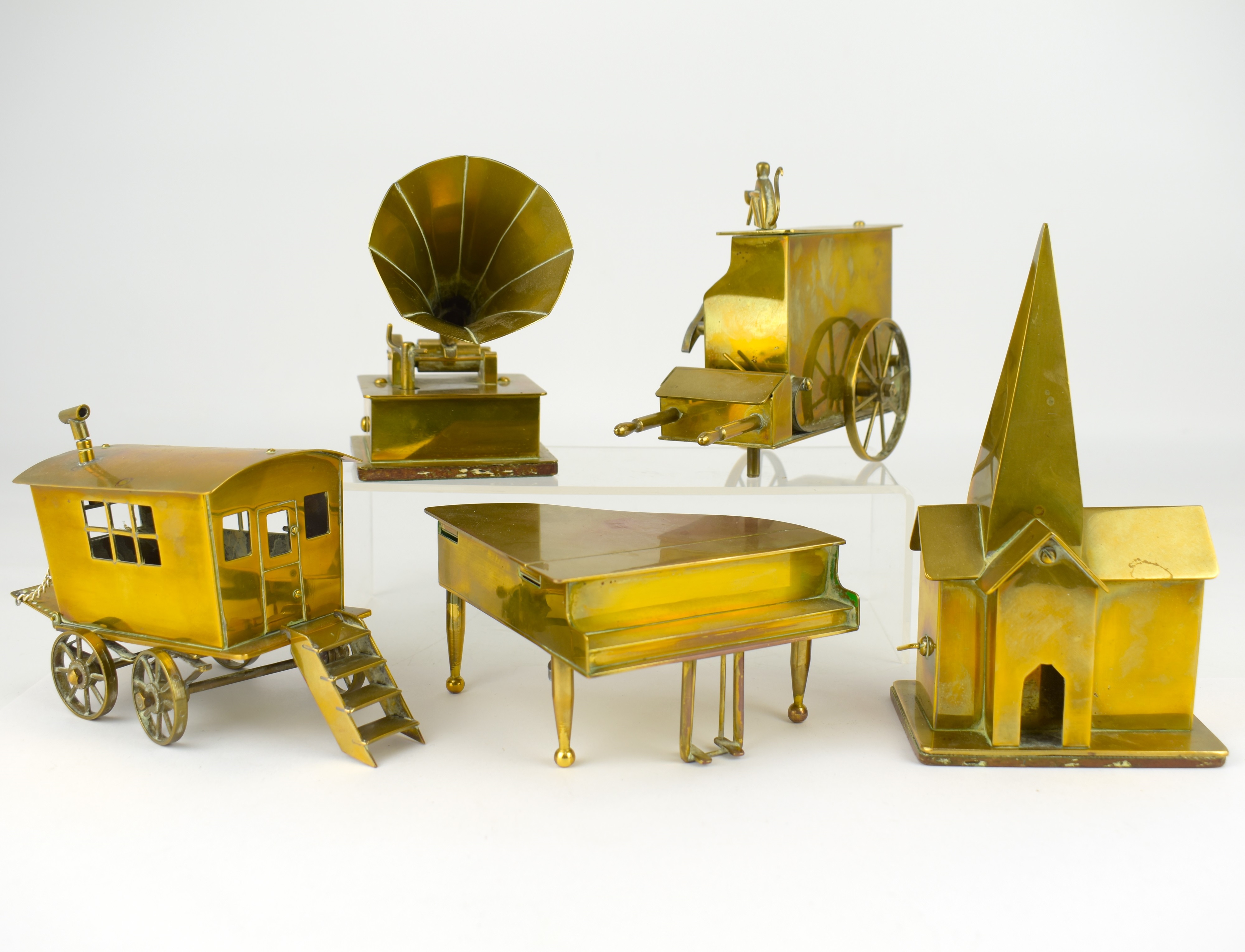Lot 144 - Five scratch-built brass model ornaments,