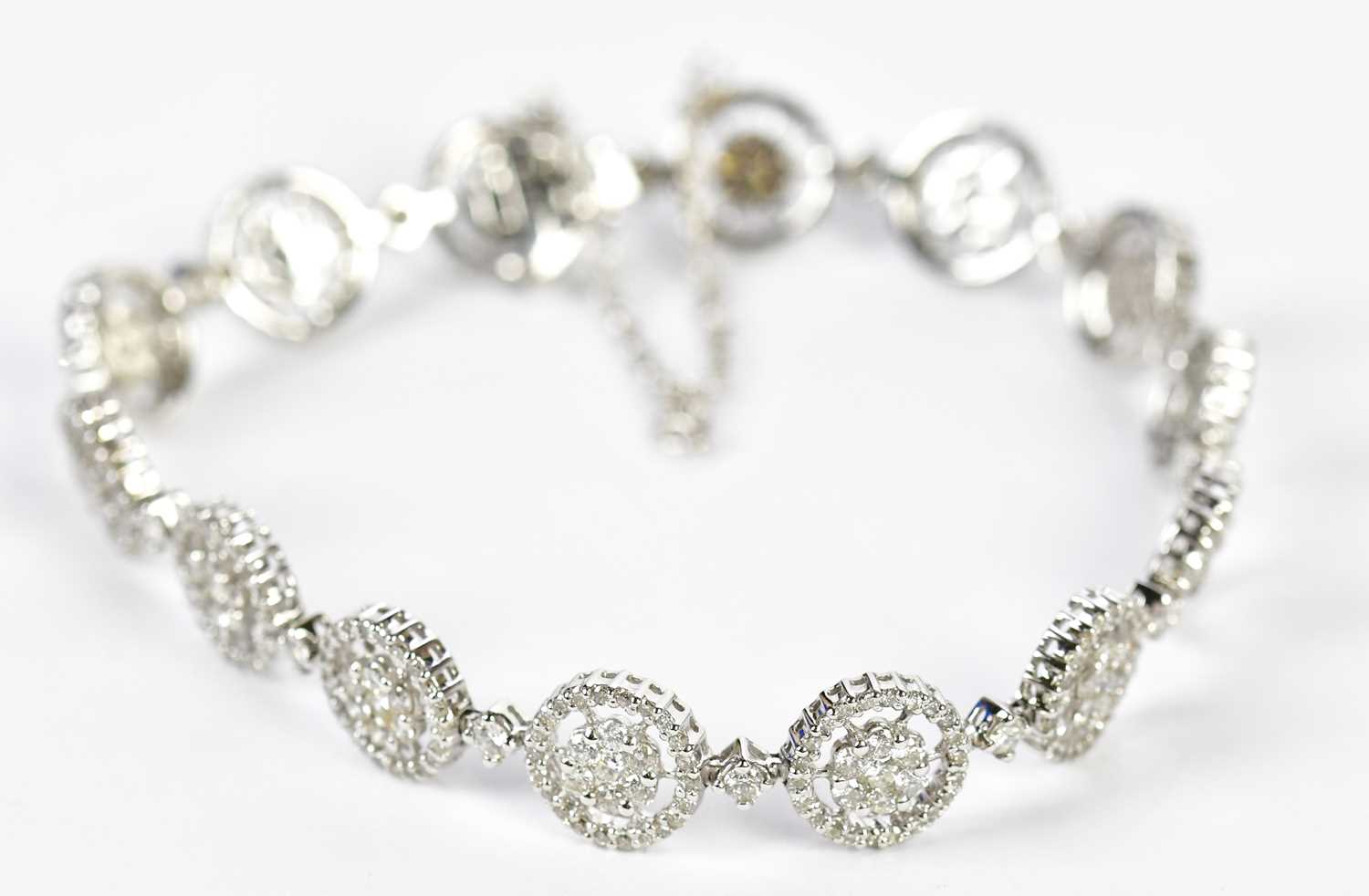 Lot 501 - An 18ct white gold diamond set bracelet
