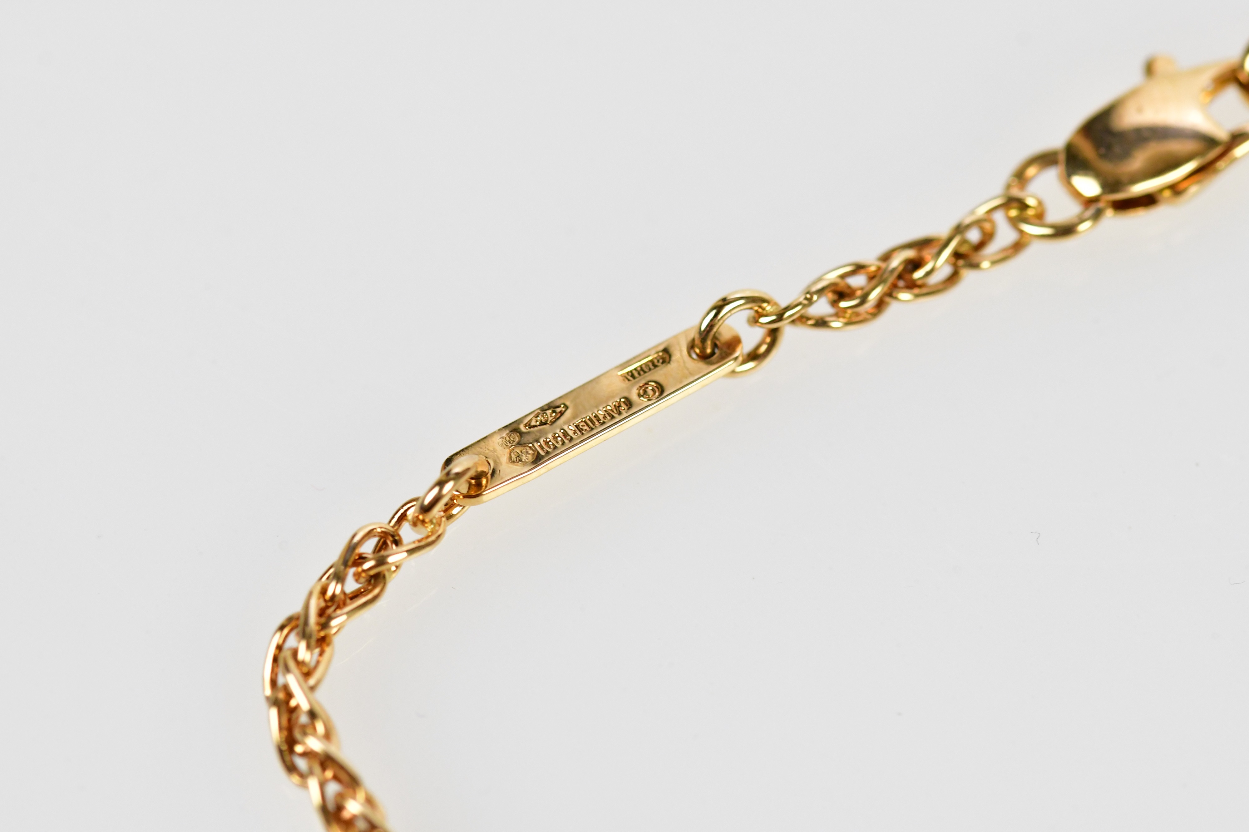 Lot 340 - CARTIER; an 18ct yellow gold chain, signed