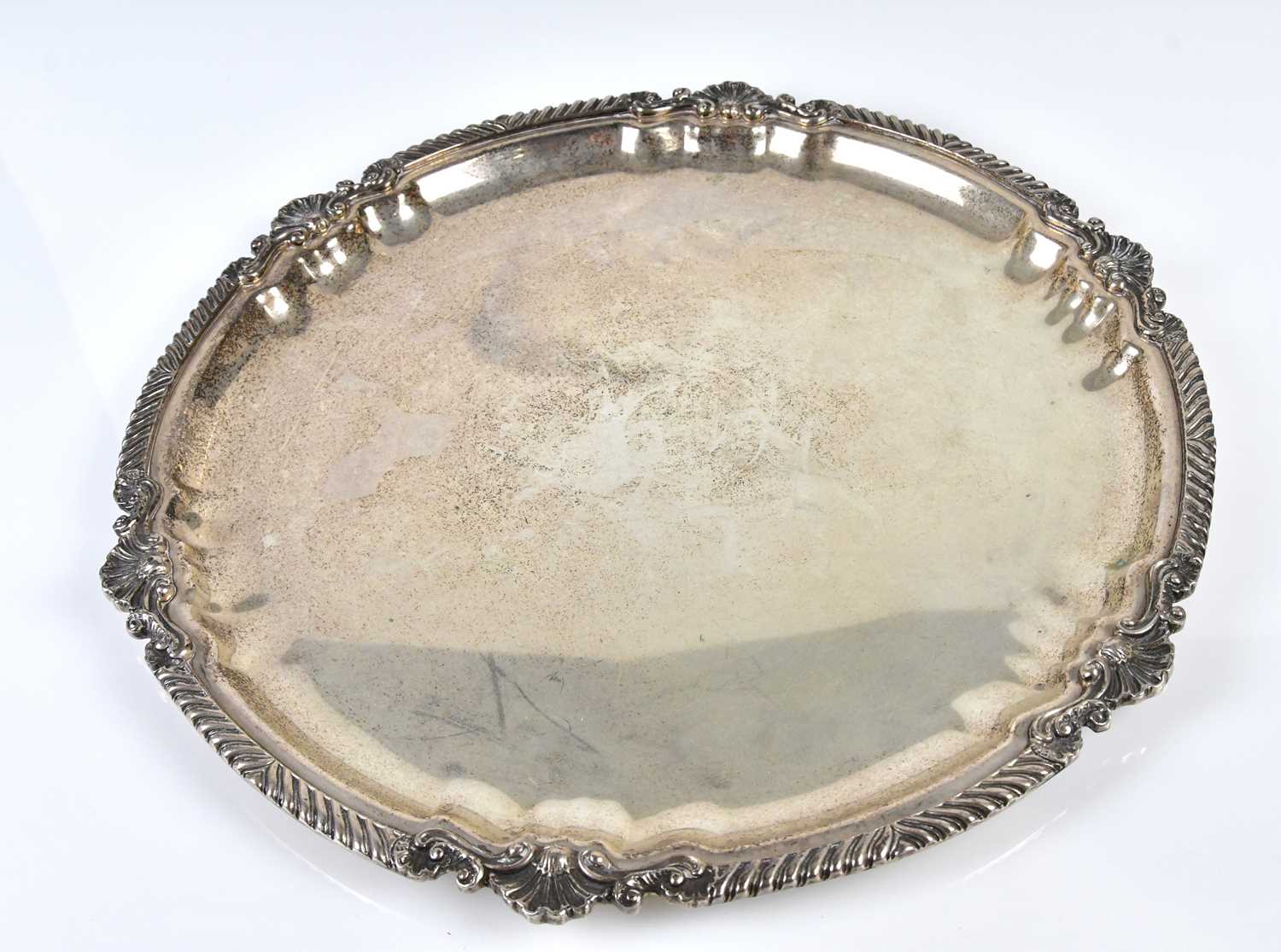 Lot 1002 - A large white metal salver stamped 'Verdi',