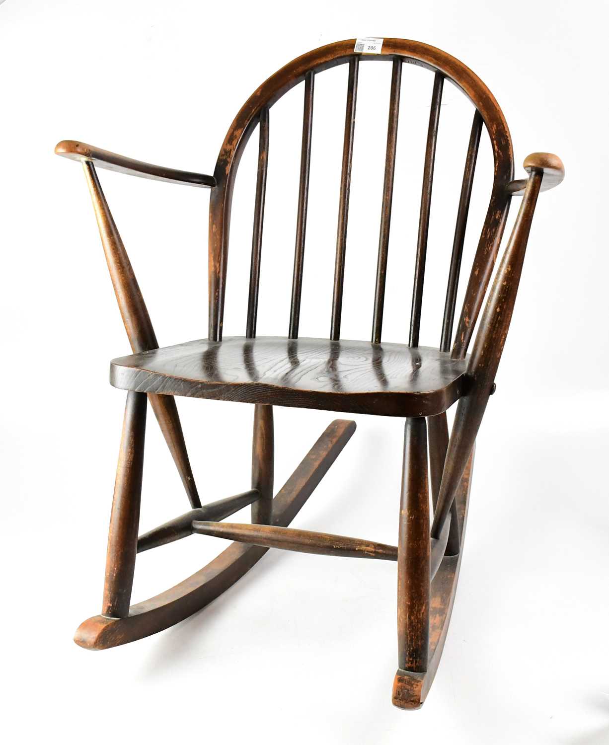 Lot 206 - A children’s wooden stick back rocking chair,