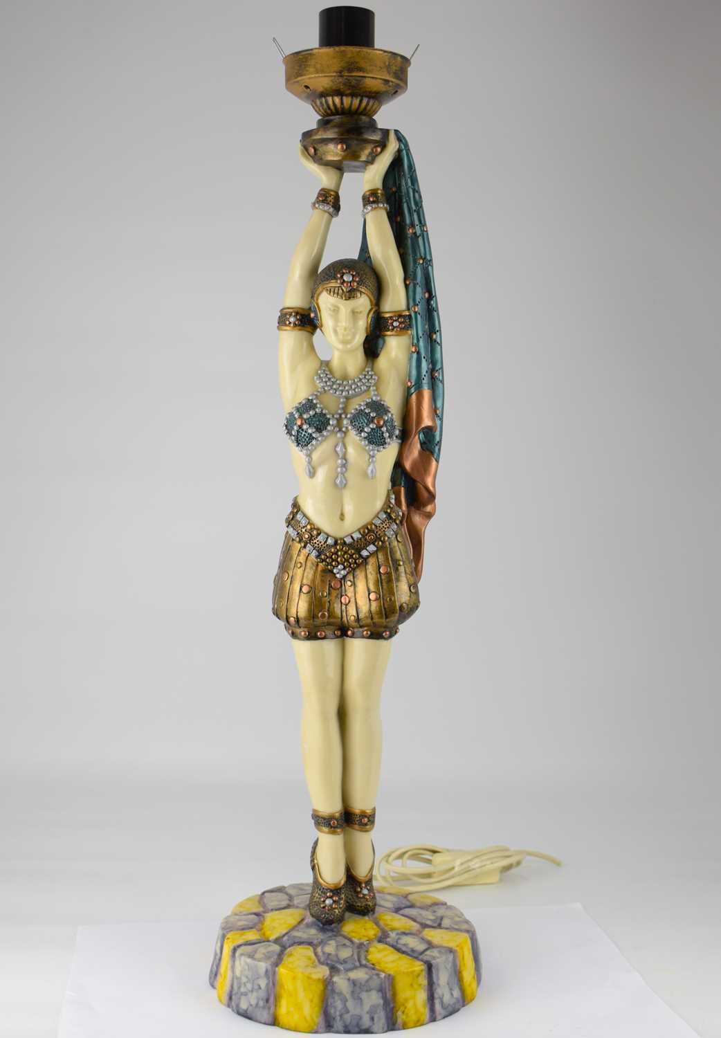 Lot 74 - A modern resin Art Deco stylised dancer table