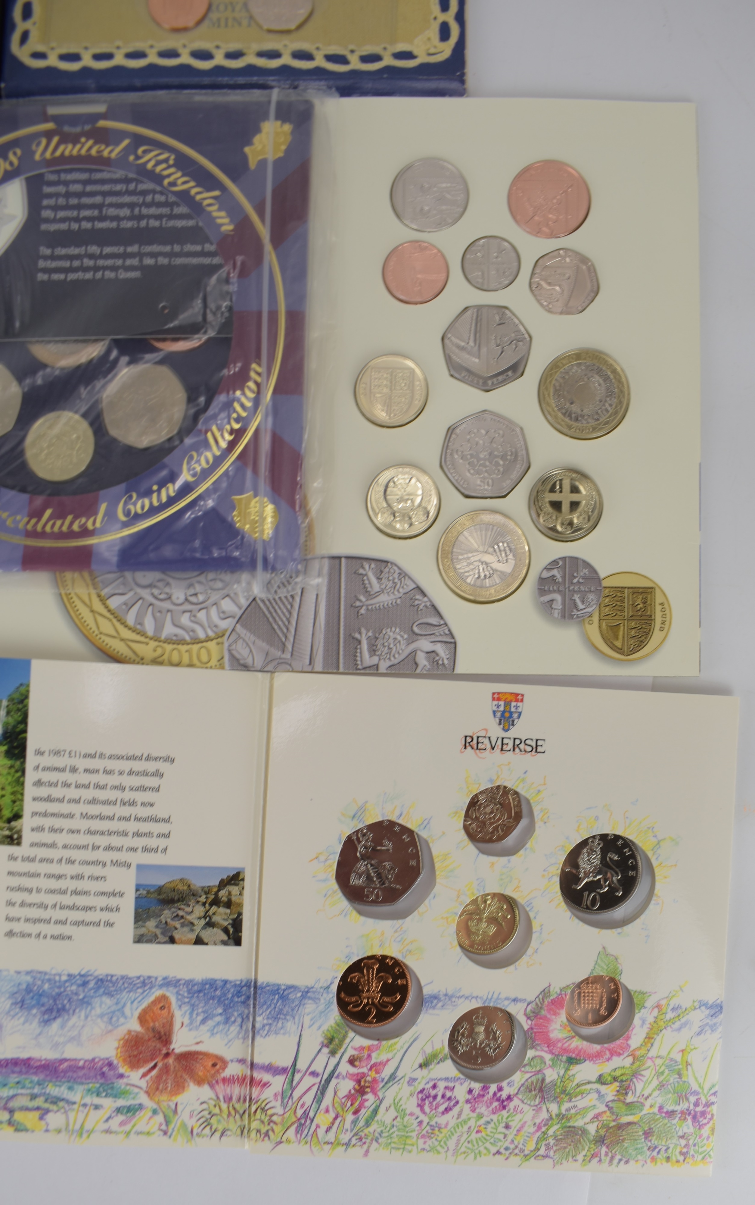 Lot 988 - ROYAL MINT; eight commemorative coin packs,