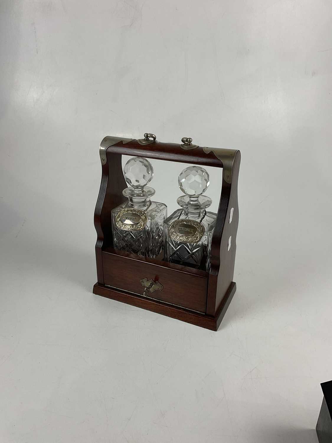 Lot 5097 - A modern mahogany two section tantalus with