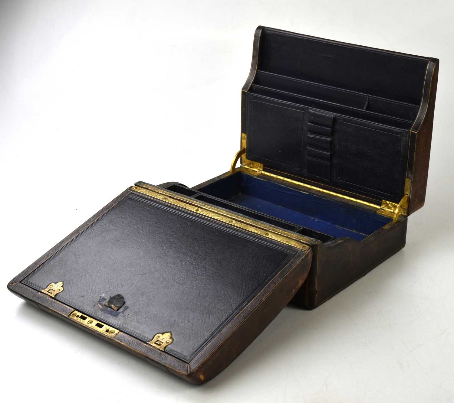 Lot 256 - A Victorian leather dome top writing slope