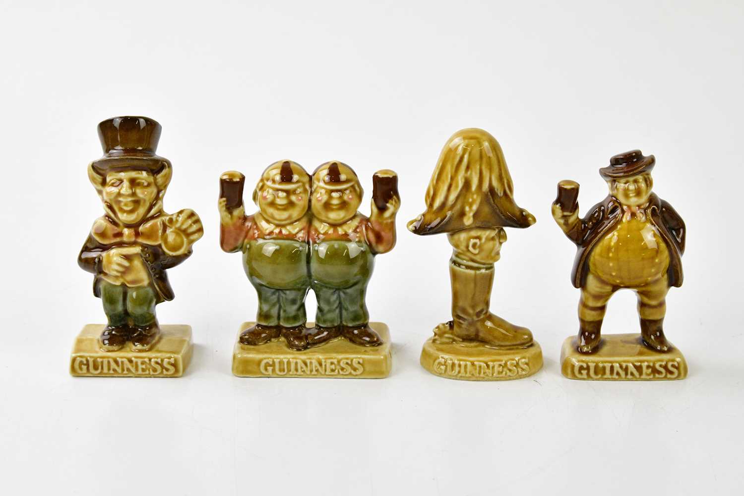 Lot 5377 - WADE; four Guinness advertising figures to