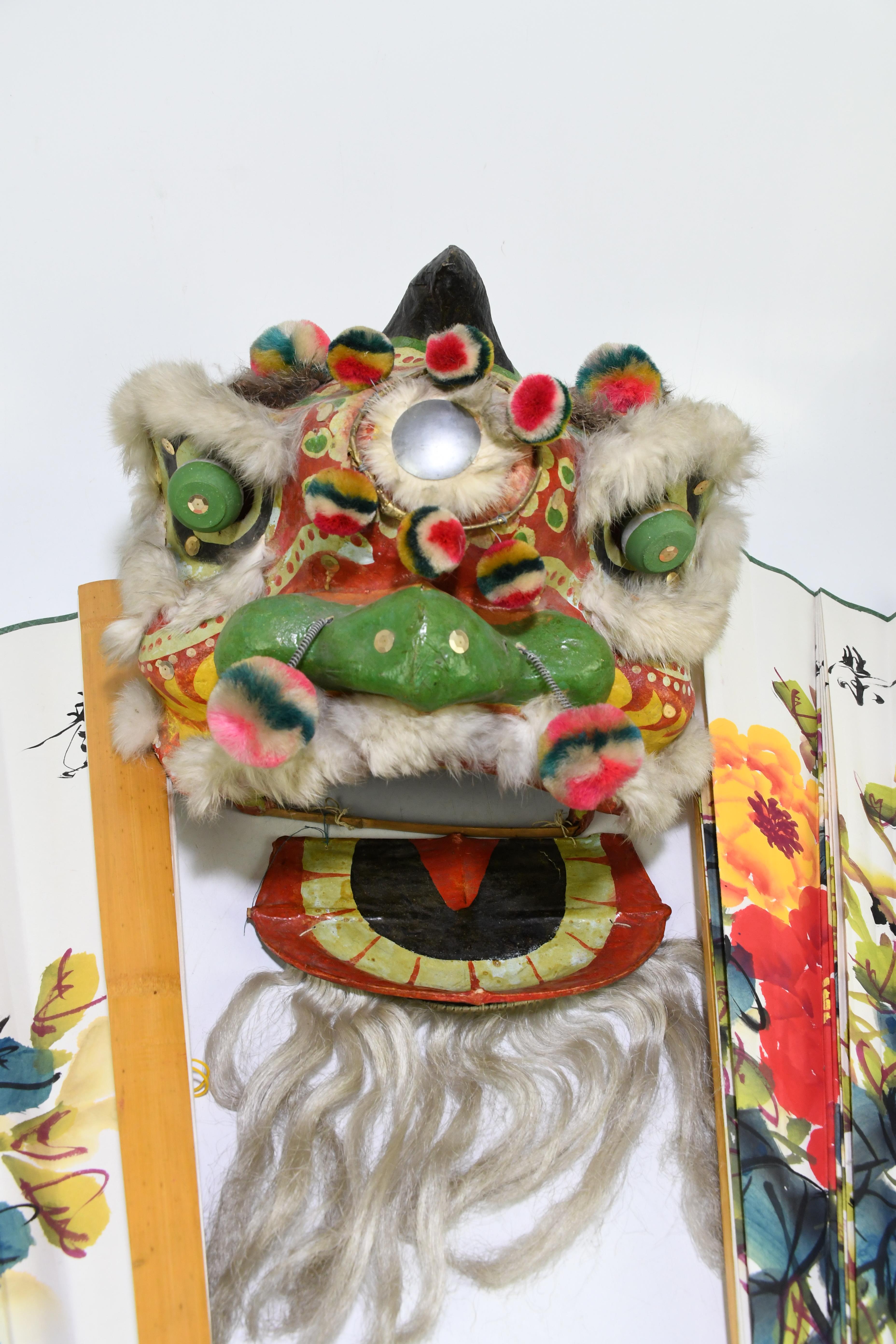 Lot 555 - A modern Chinese papier-mâché dragon mask,