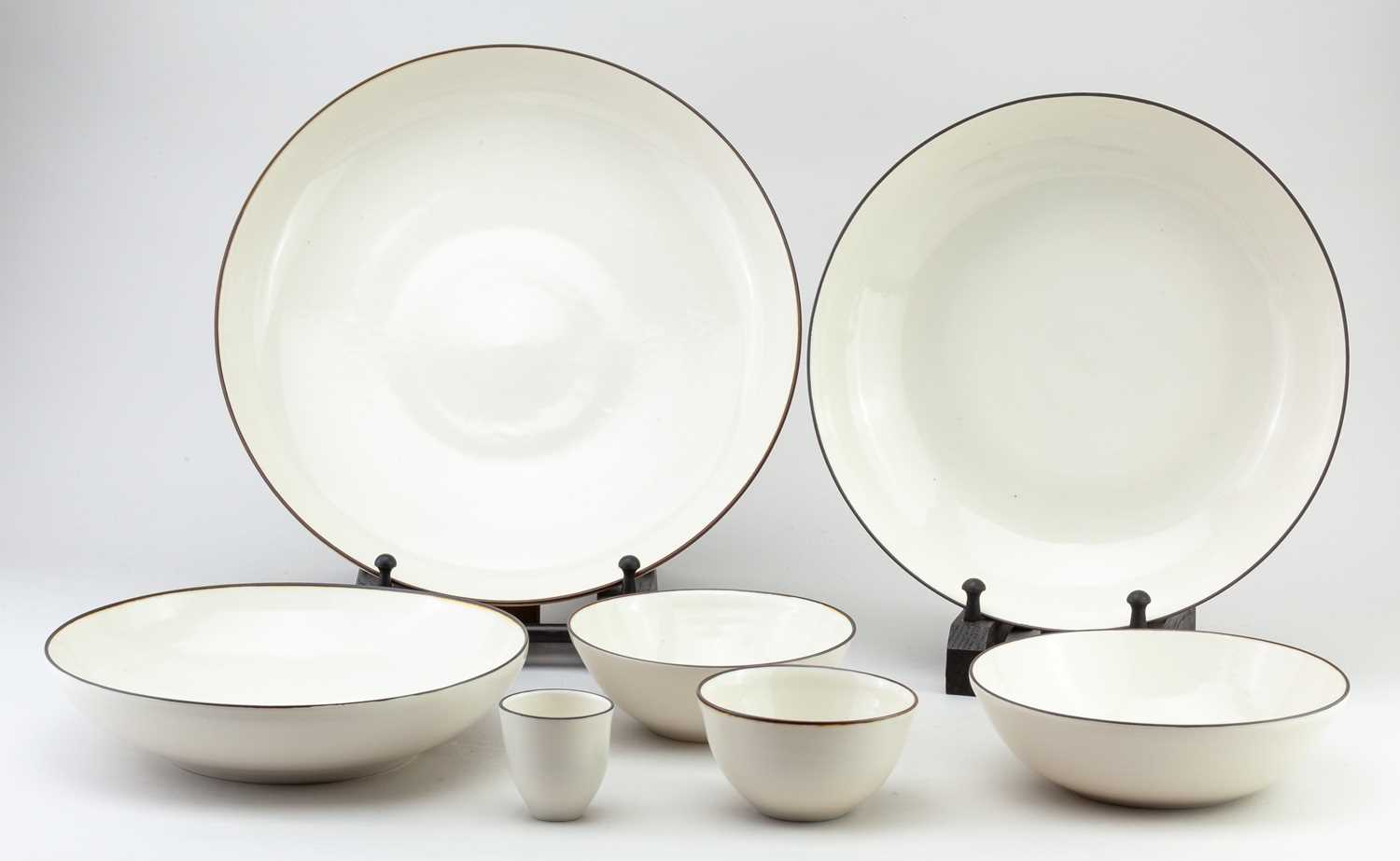 Lot 138 - DANIEL SMITH; a nest of seven porcelain