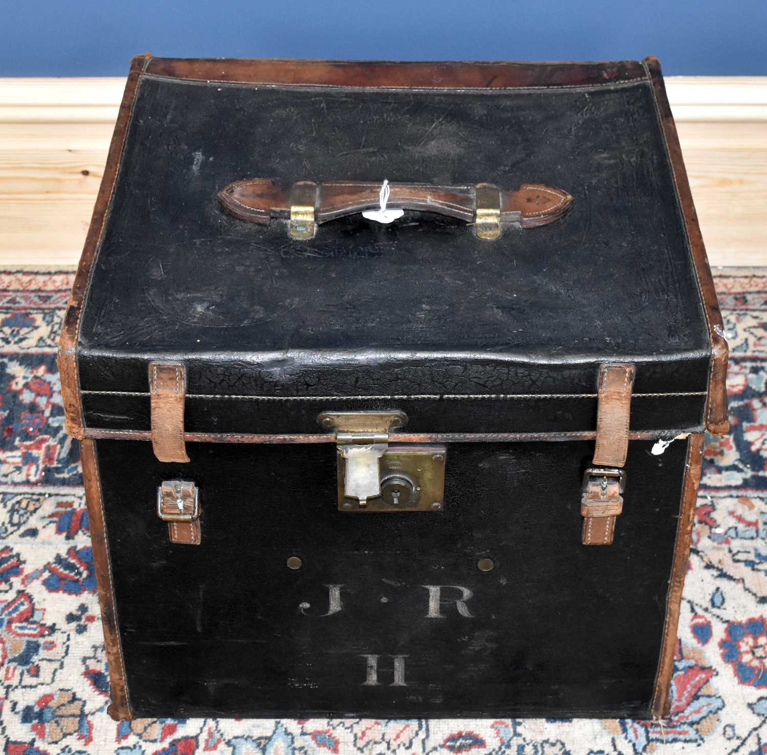 Lot 777 - A late 19th century black leather steamer