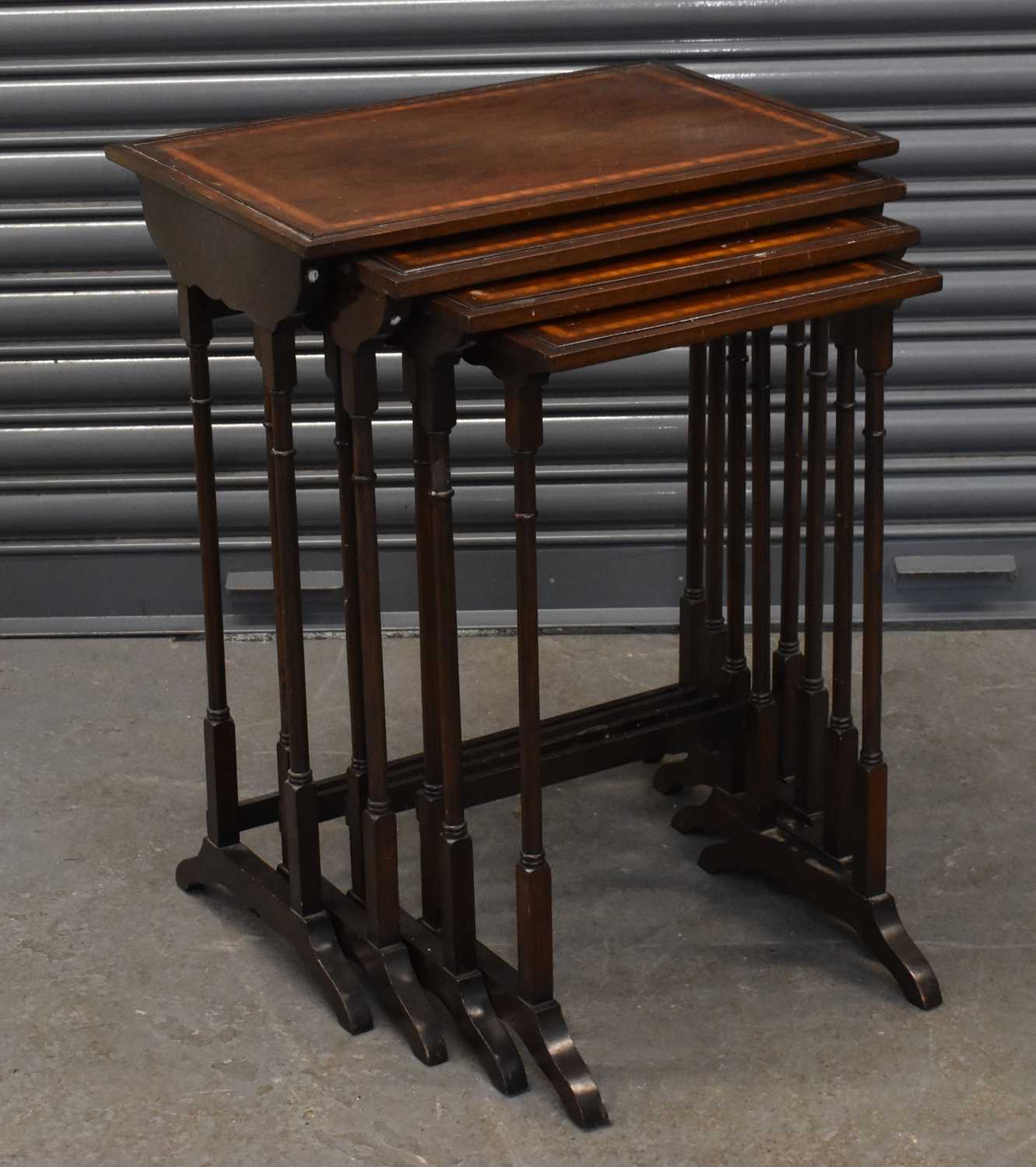 Lot 62 - An Edwardian nest of four mahogany and