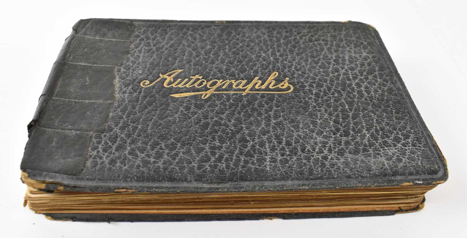 Lot 396 - A leather bound autograph book containing