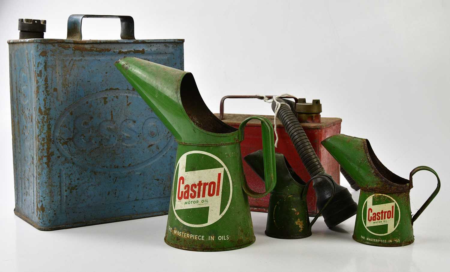 Lot 253 - A group of three Castrol oil cans, together