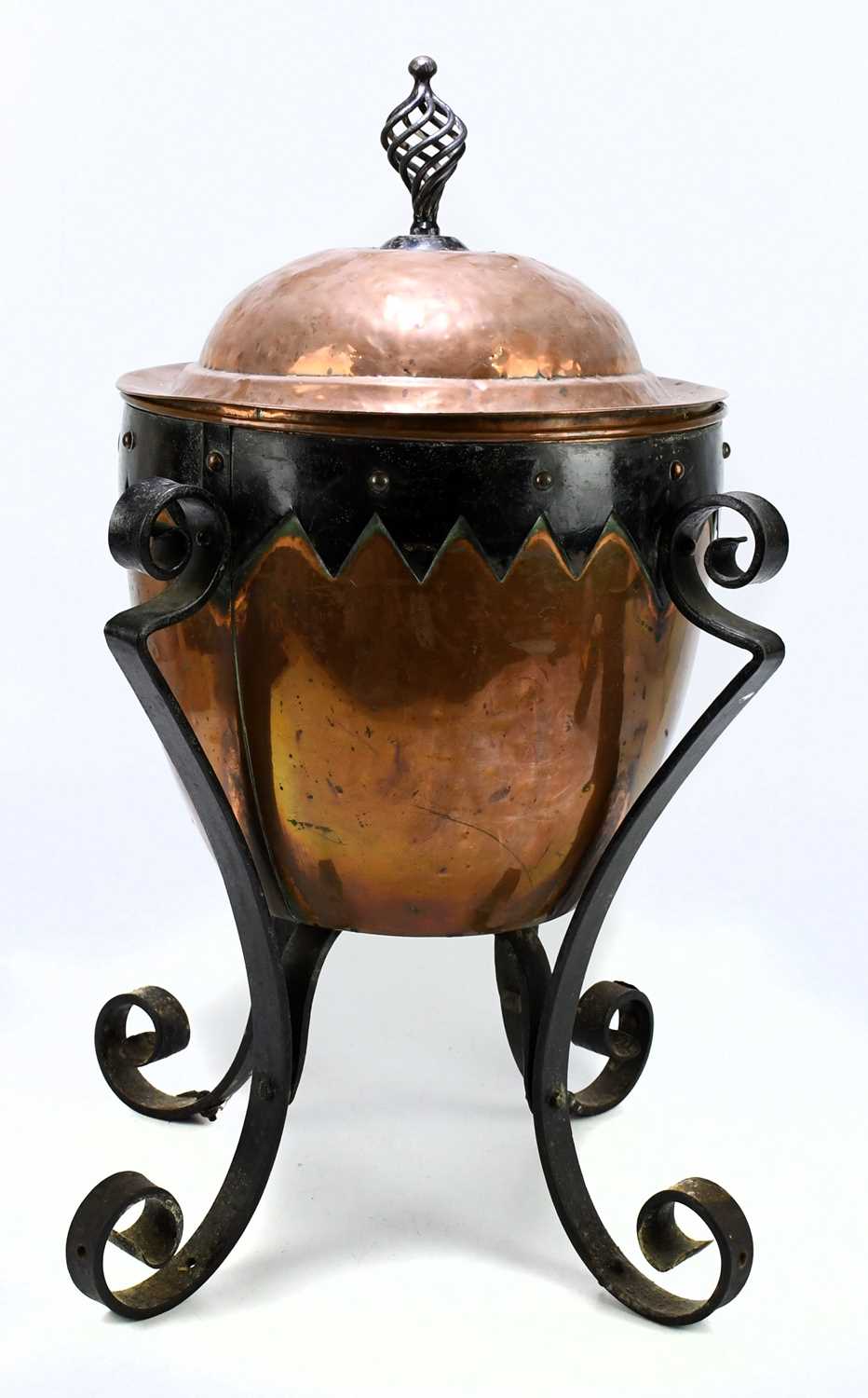 Lot 171 - An Arts and Crafts wrought iron and copper