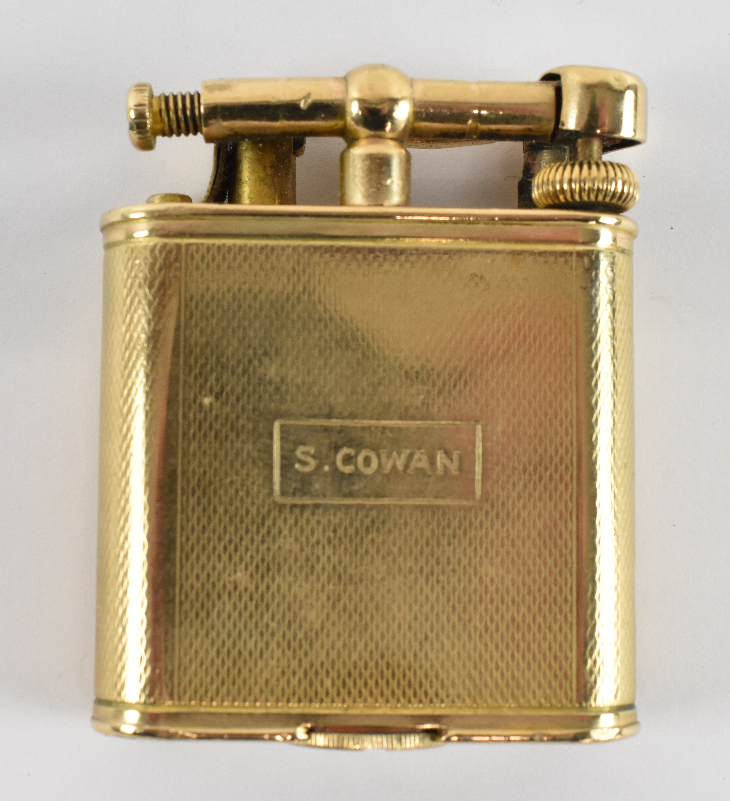 Lot 898 - DUNHILL; a 9ct yellow gold cigarette lighter,