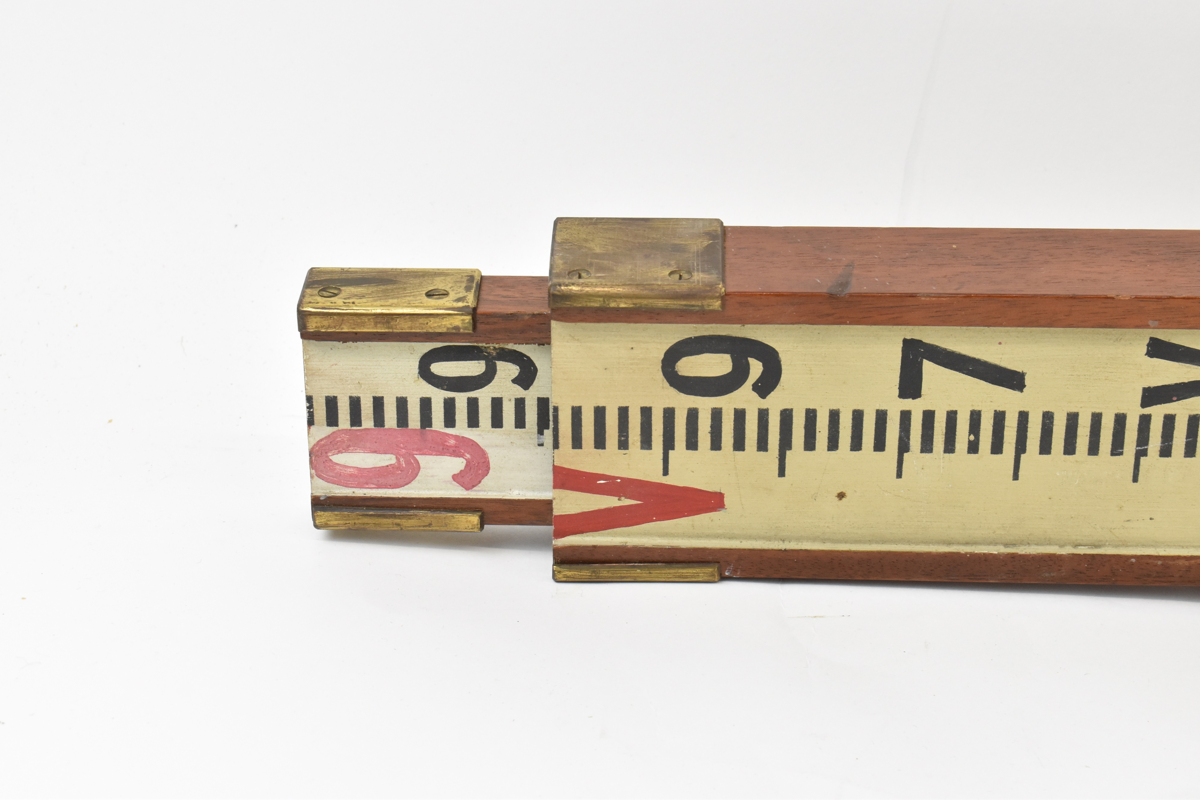 Lot 361 - An early 20th century extendable measuring