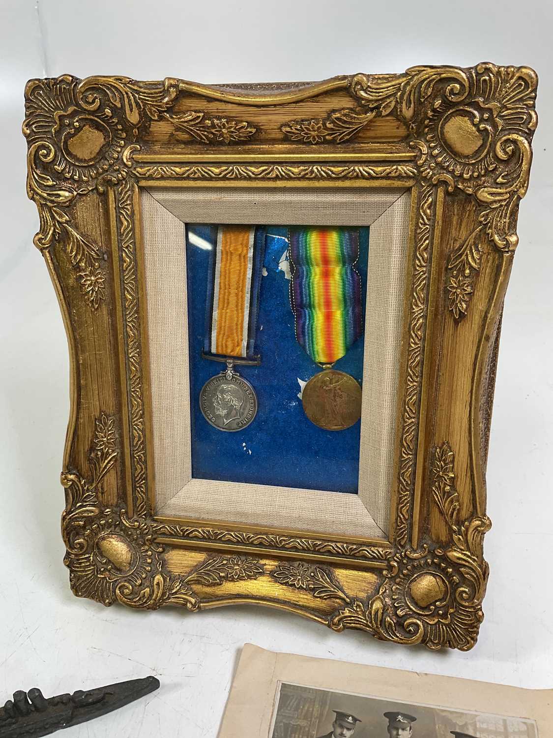 Lot 84 - A collection of medals, photos and some
