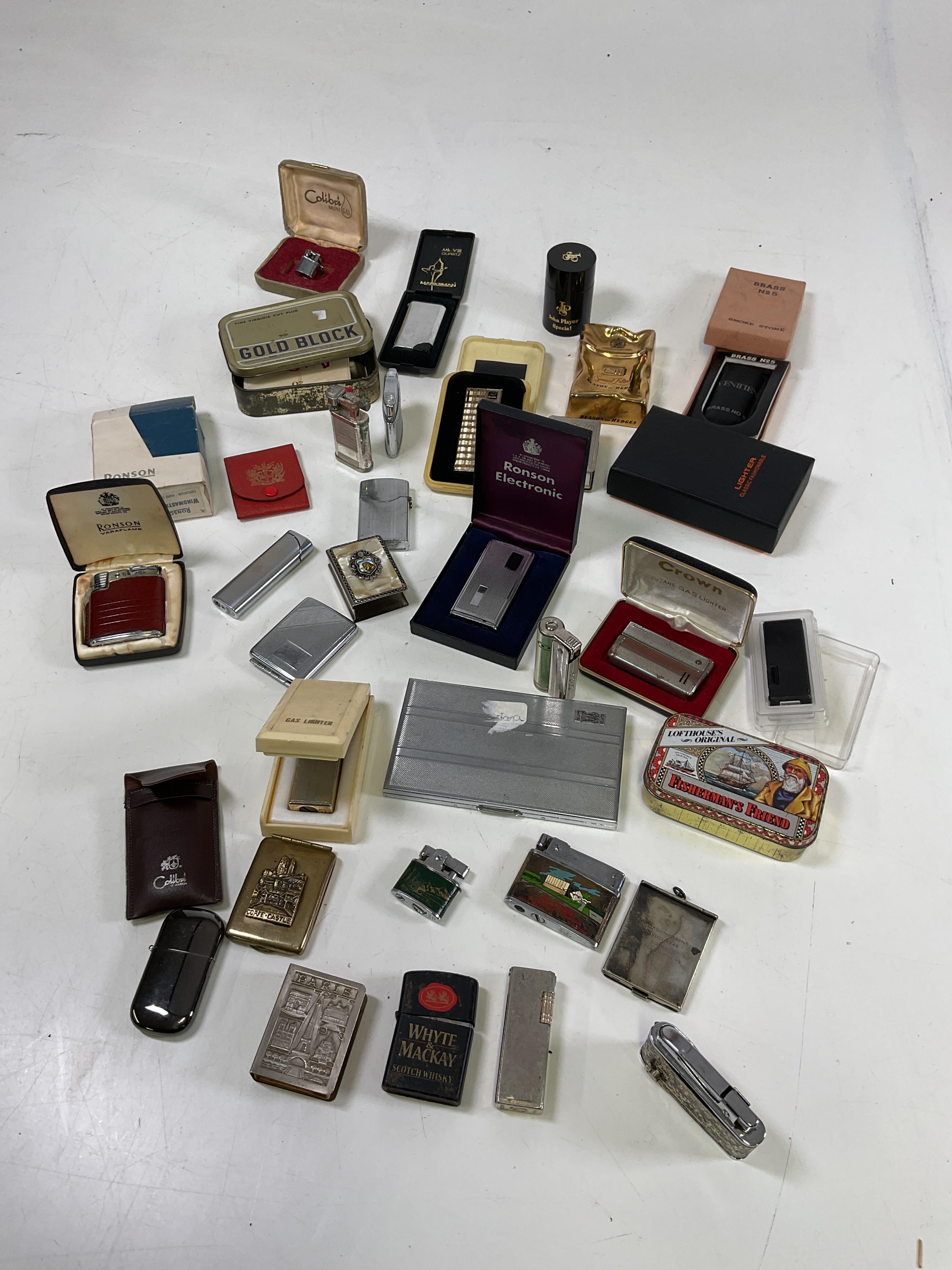 Lot 10 - A group of vintage lighters including a 1950s