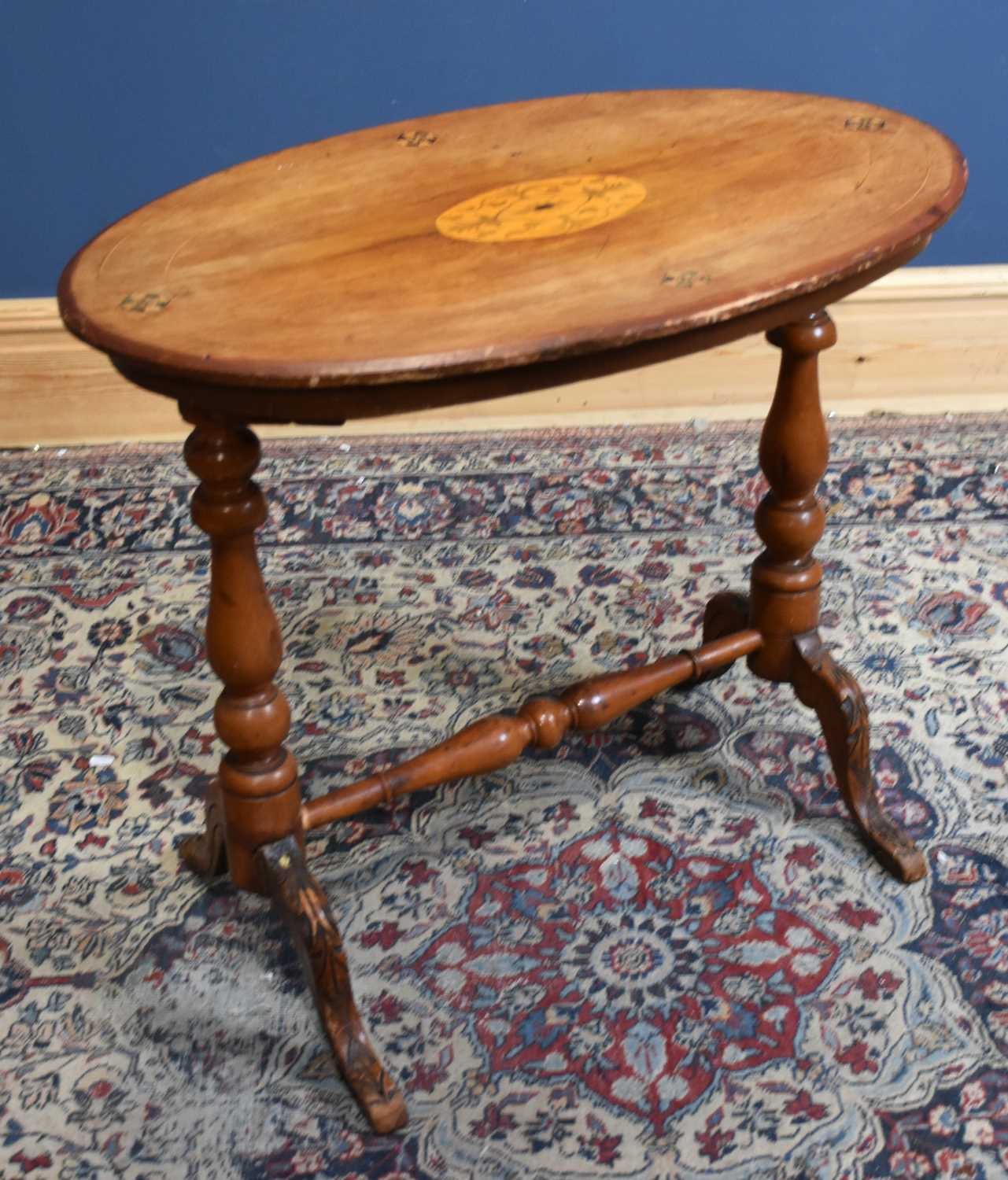 Lot 56 - A Victorian walnut oval side table, height