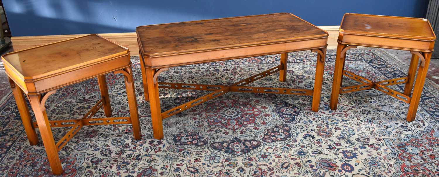 Lot 115 - A modern yew wood veneered rectangular