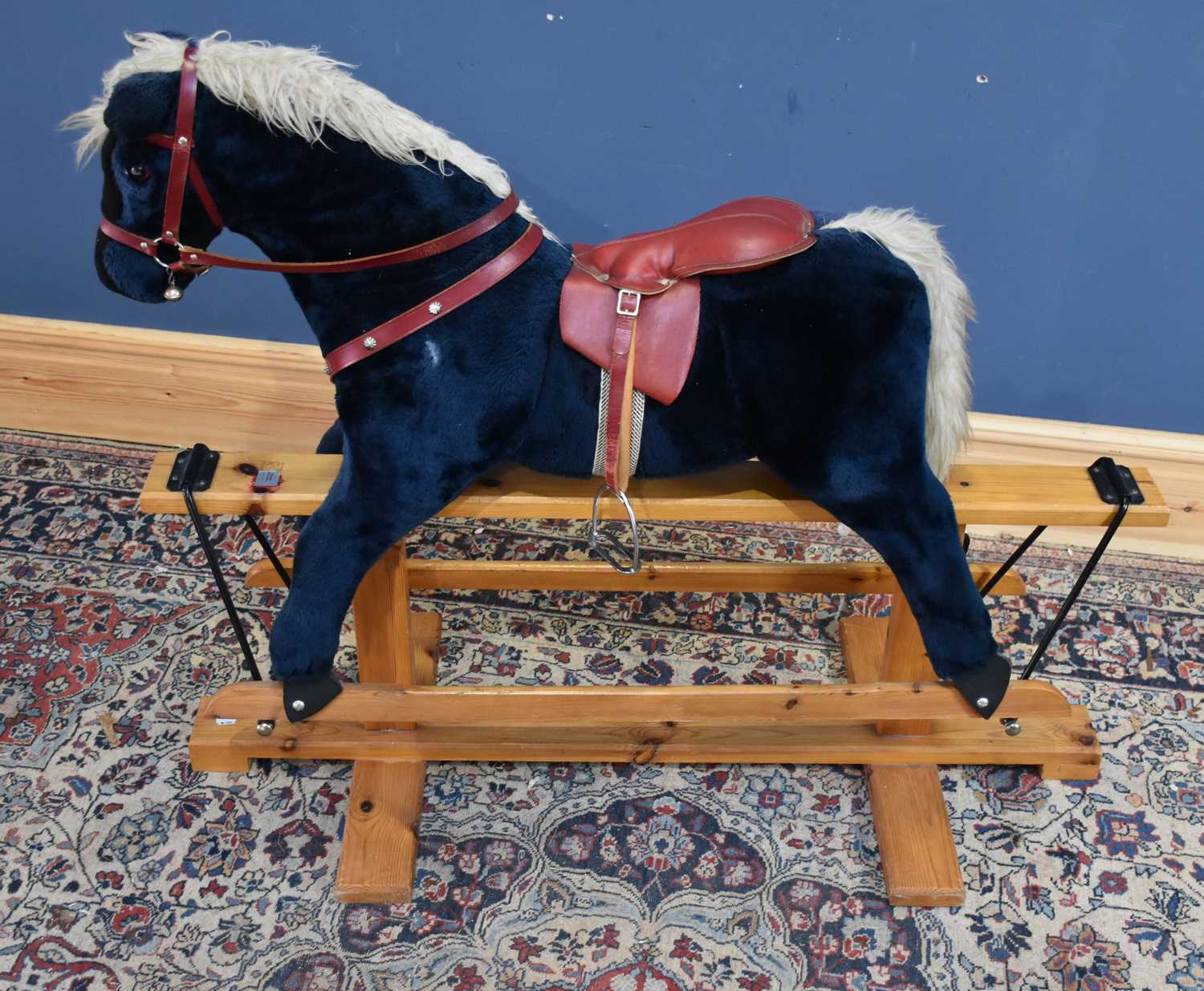 Lot 414 - PEGASUS; a modern rocking horse on pine base,