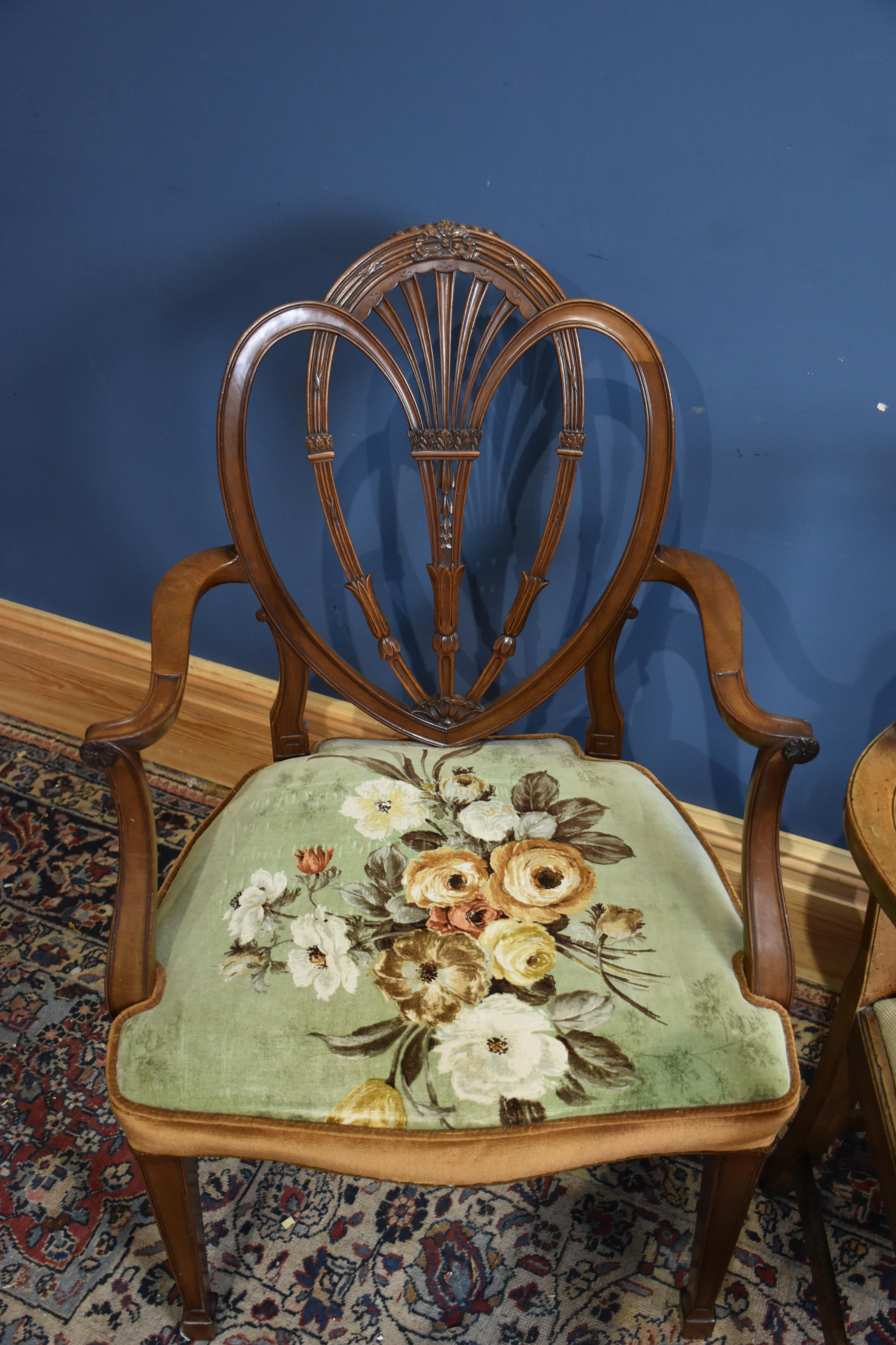 Lot 113 - A George III style mahogany wheel back chair,