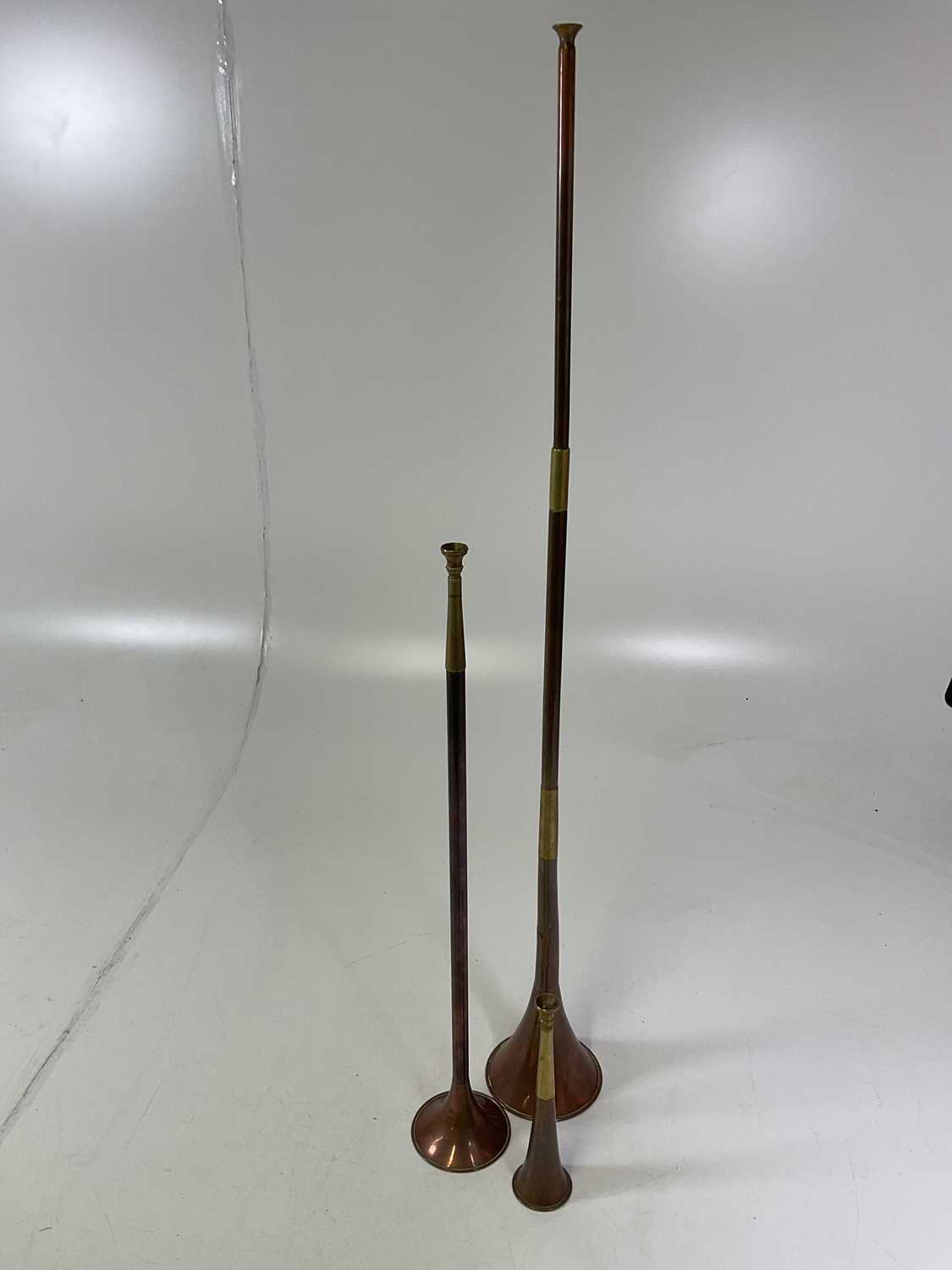 Lot 90 - A post horn and two hunting horns.