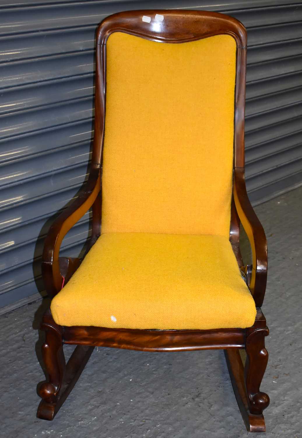 Lot 95 - A Victorian mahogany rocking chair with