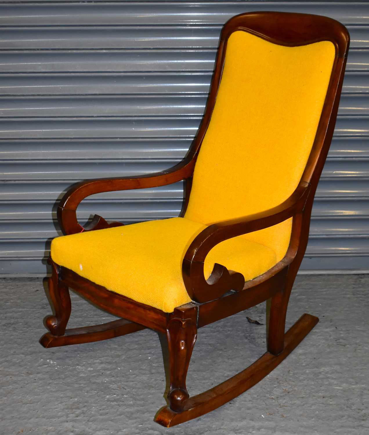 Lot 95 - A Victorian mahogany rocking chair with