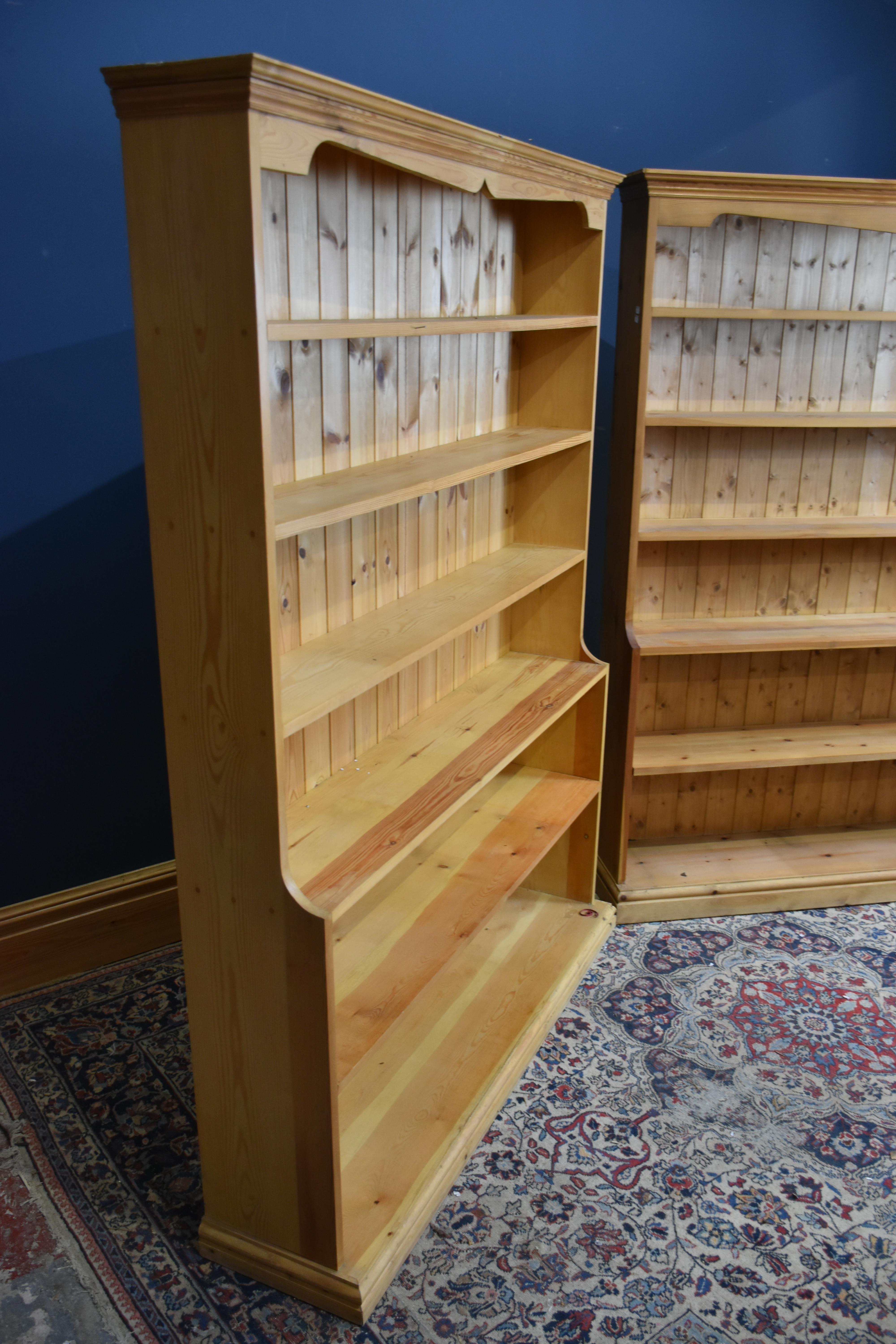 Lot 164 - A pair of modern pine waterfall bookcases
