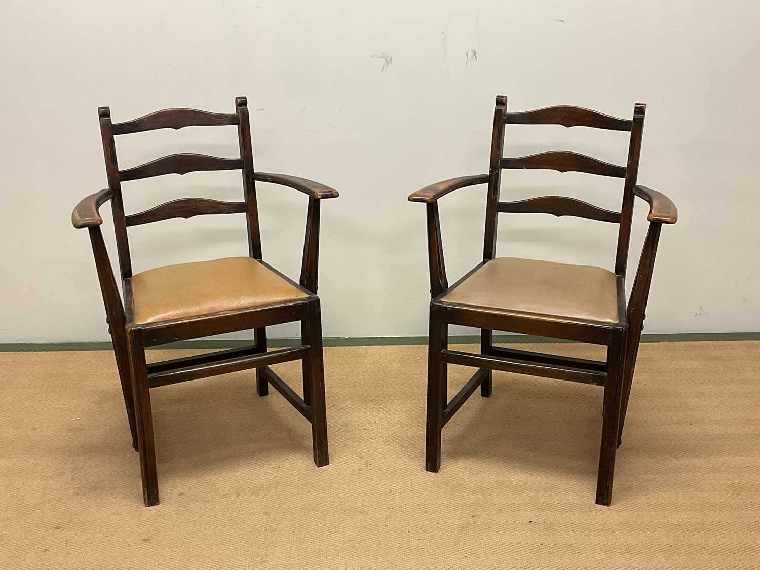 Lot 510 - ERCOL; a pair of early Ercol chairs.