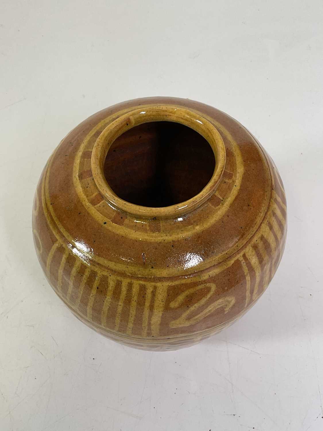 Lot 214 - An early 20th century slipware pottery vase