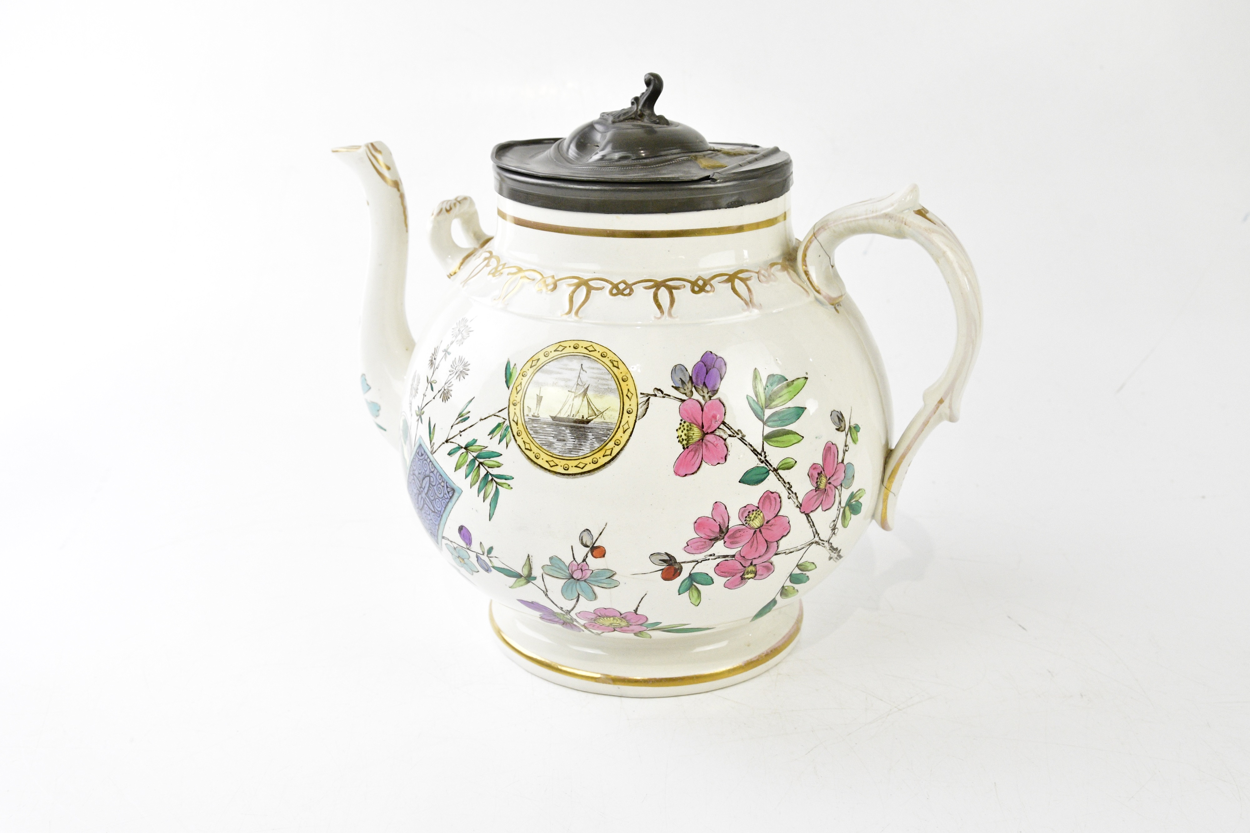 Lot 1333 - A Victorian ceramic oversized teapot,