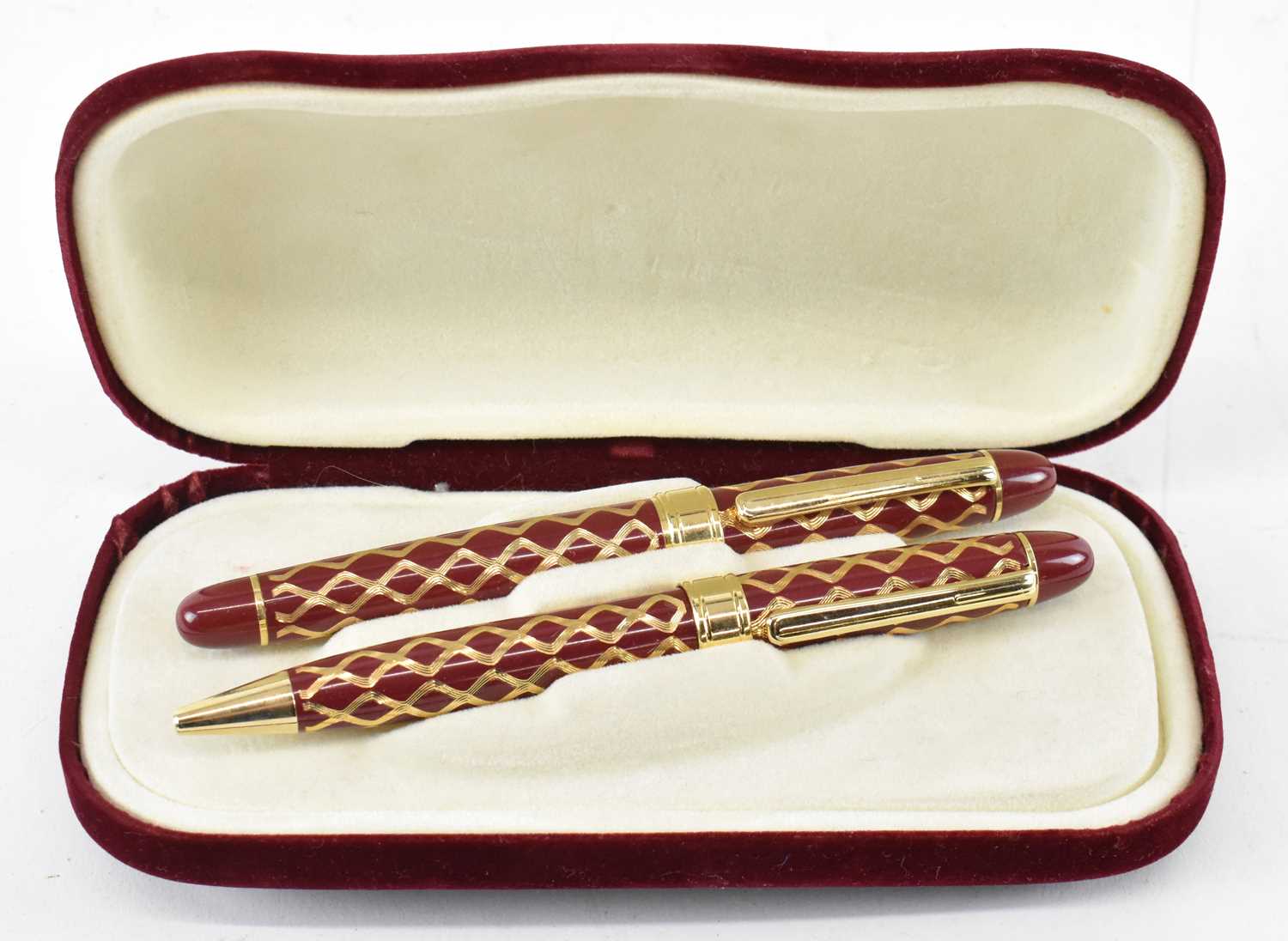 Lot 342 - A cased yellow metal mounted ballpoint pen