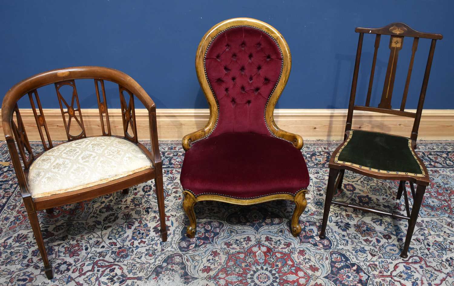 Lot 82 - A reproduction spoon back nursing chair, an