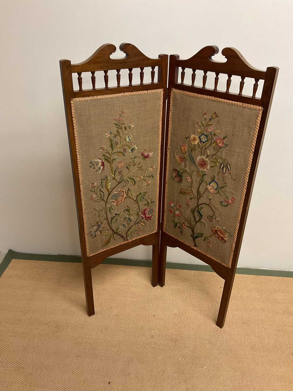 Lot 516 - A tapestry screen, height 130cm, width 90cm.