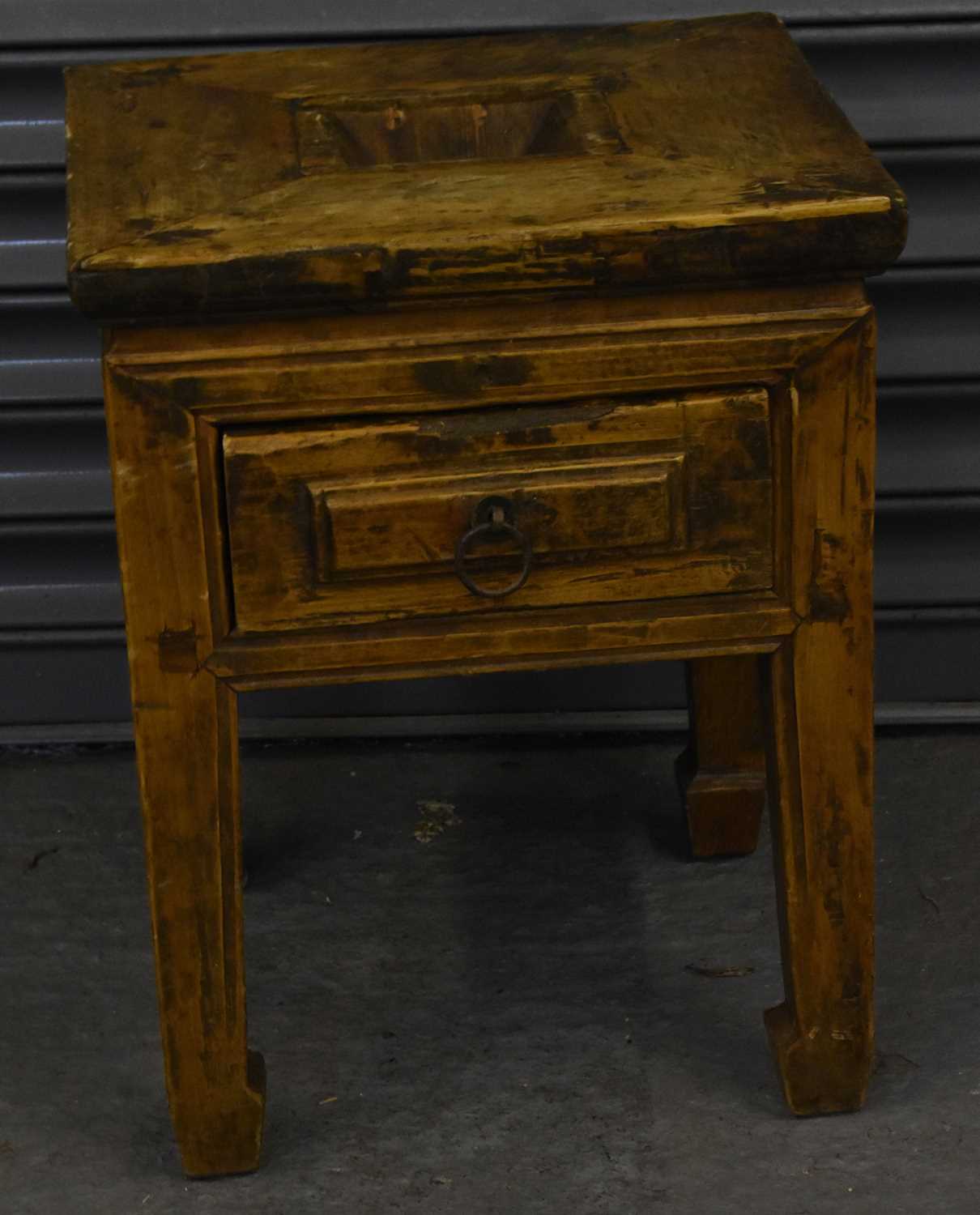 Lot 82 - A Chinese elm grain box with drawer, width