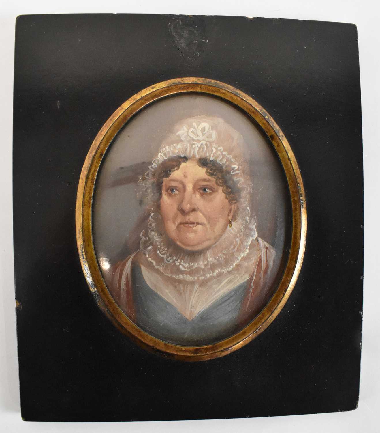 Lot 355 - A Victorian oval portrait miniature painted