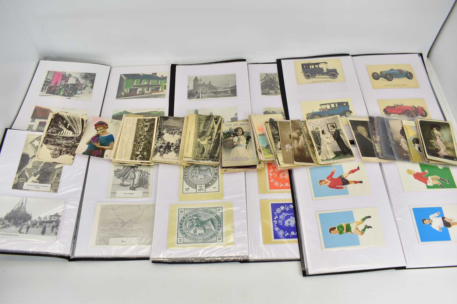 Lot 525 - Nine various postcard albums and a quantity