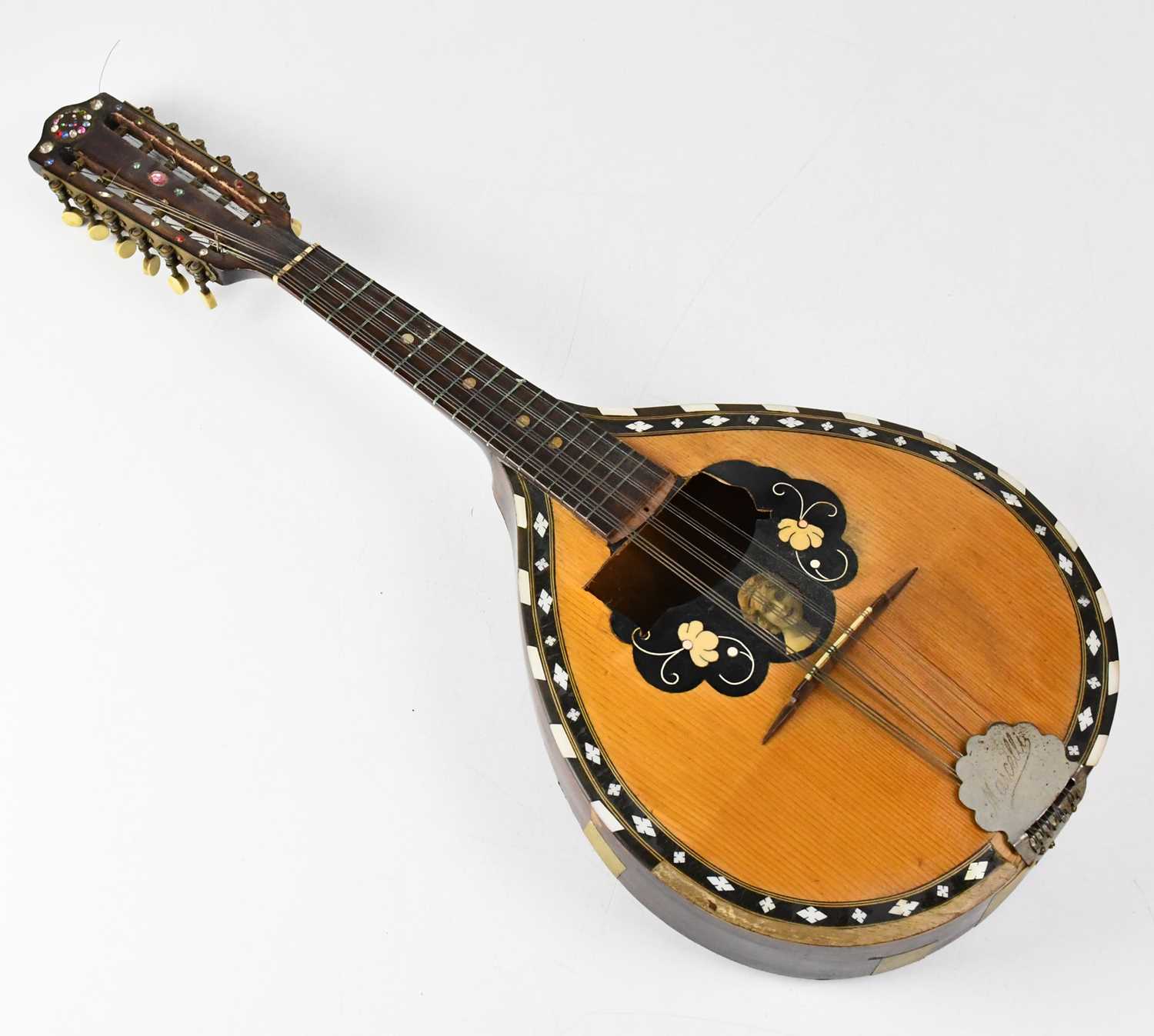 Lot 495 - A Marcelli flat back mandolin embossed with