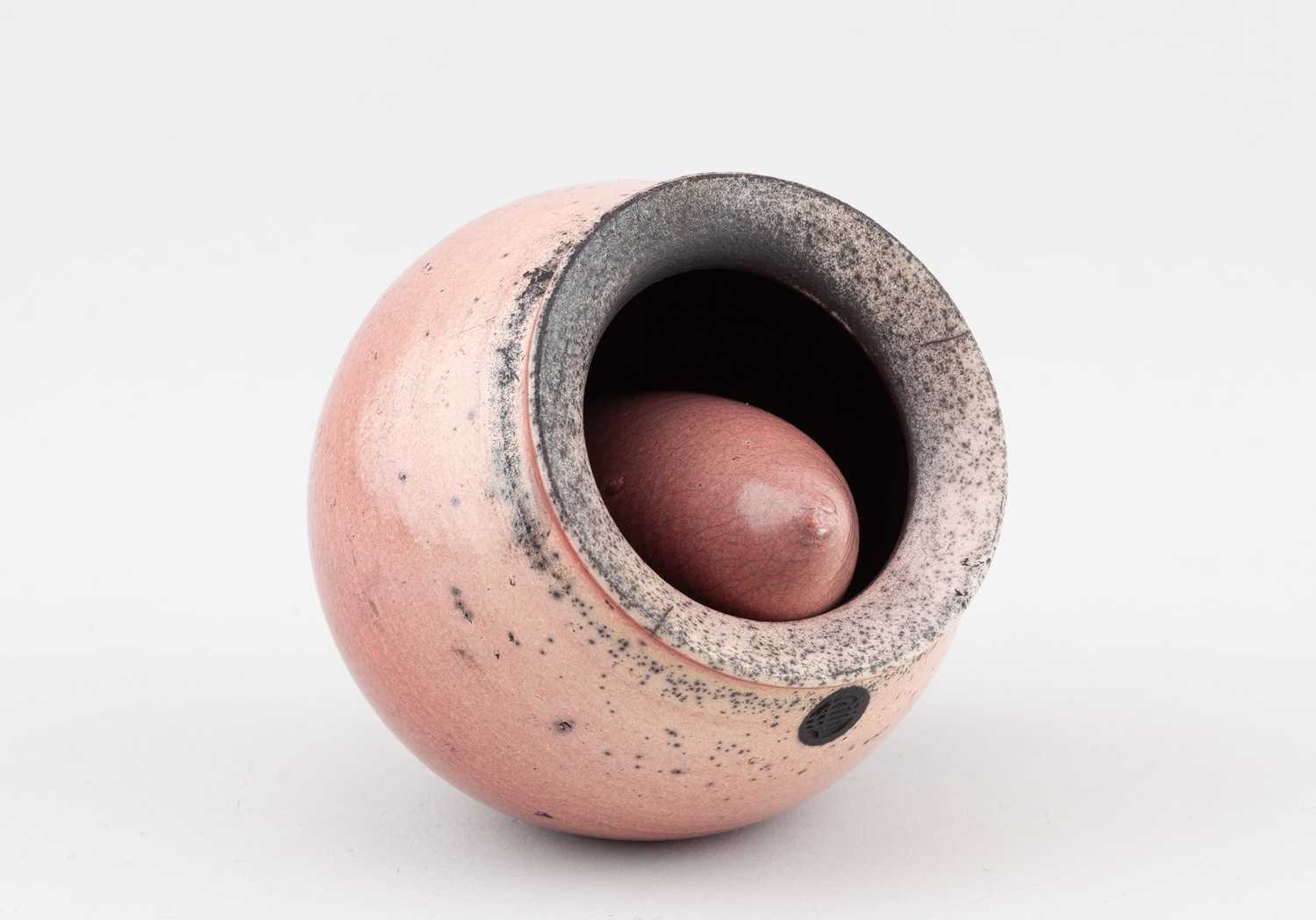 Lot 179 - ERIC MOSS (born 1959); a raku seed pod