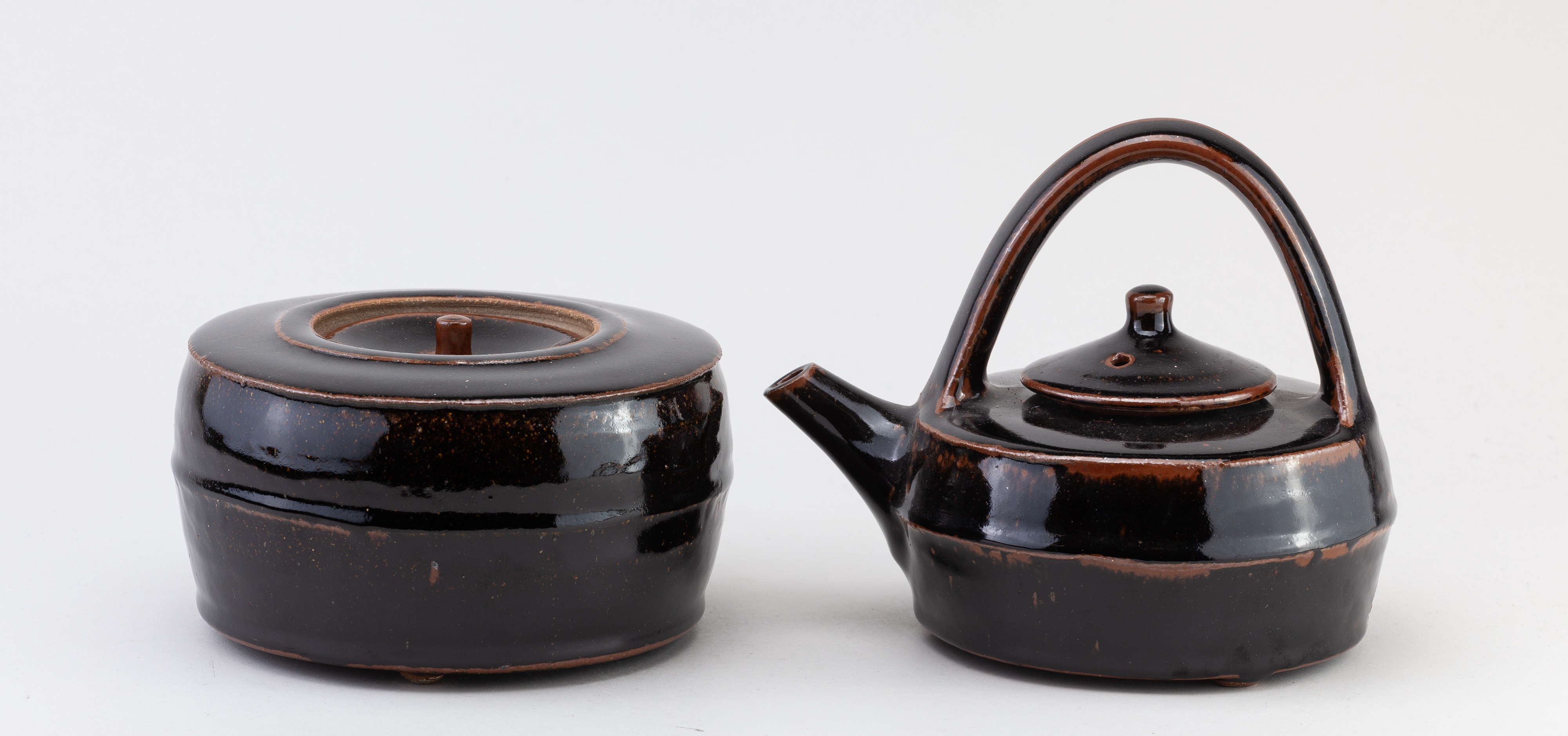 Lot 479 - PHIL ROGERS (1951-2020); a stoneware teapot