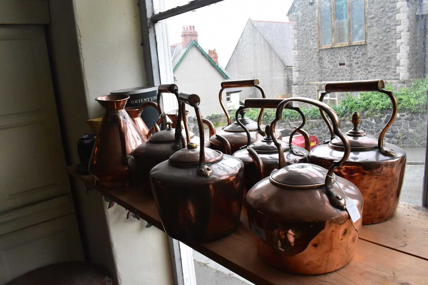 Lot 1292 - A collection of 19th century copper kettles