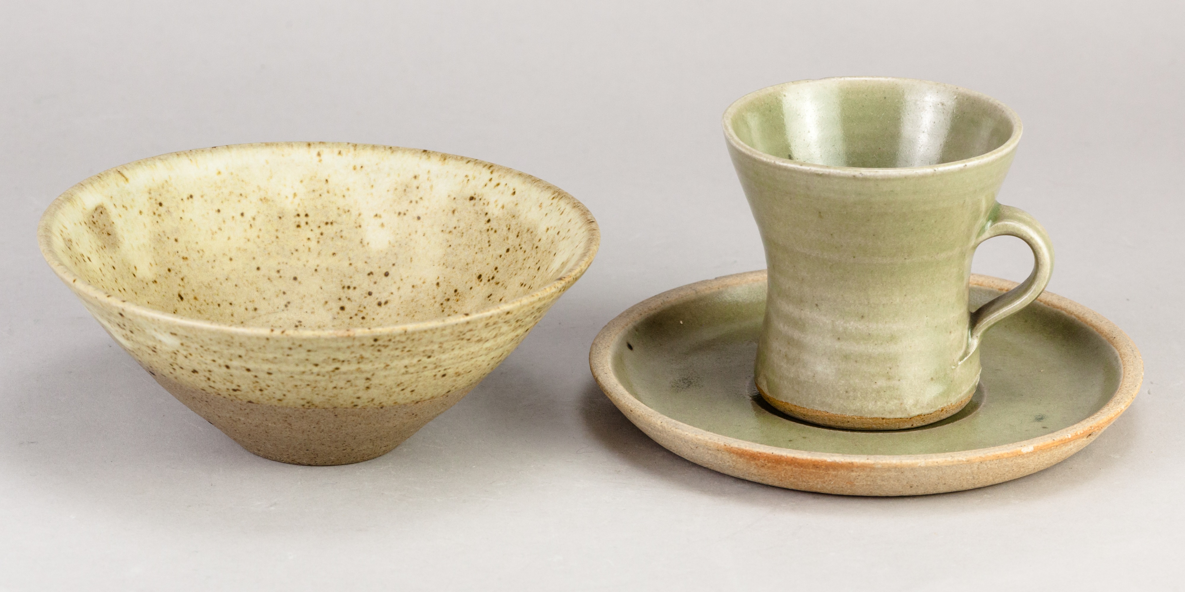 Lot 95 - Leach Pottery; a stoneware cup and saucer