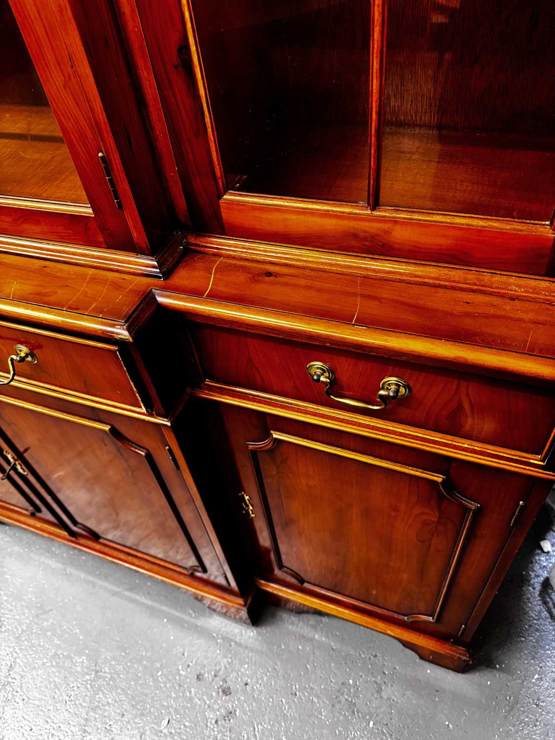 Lot 32 - A reproduction bookcase, with pair of glazed
