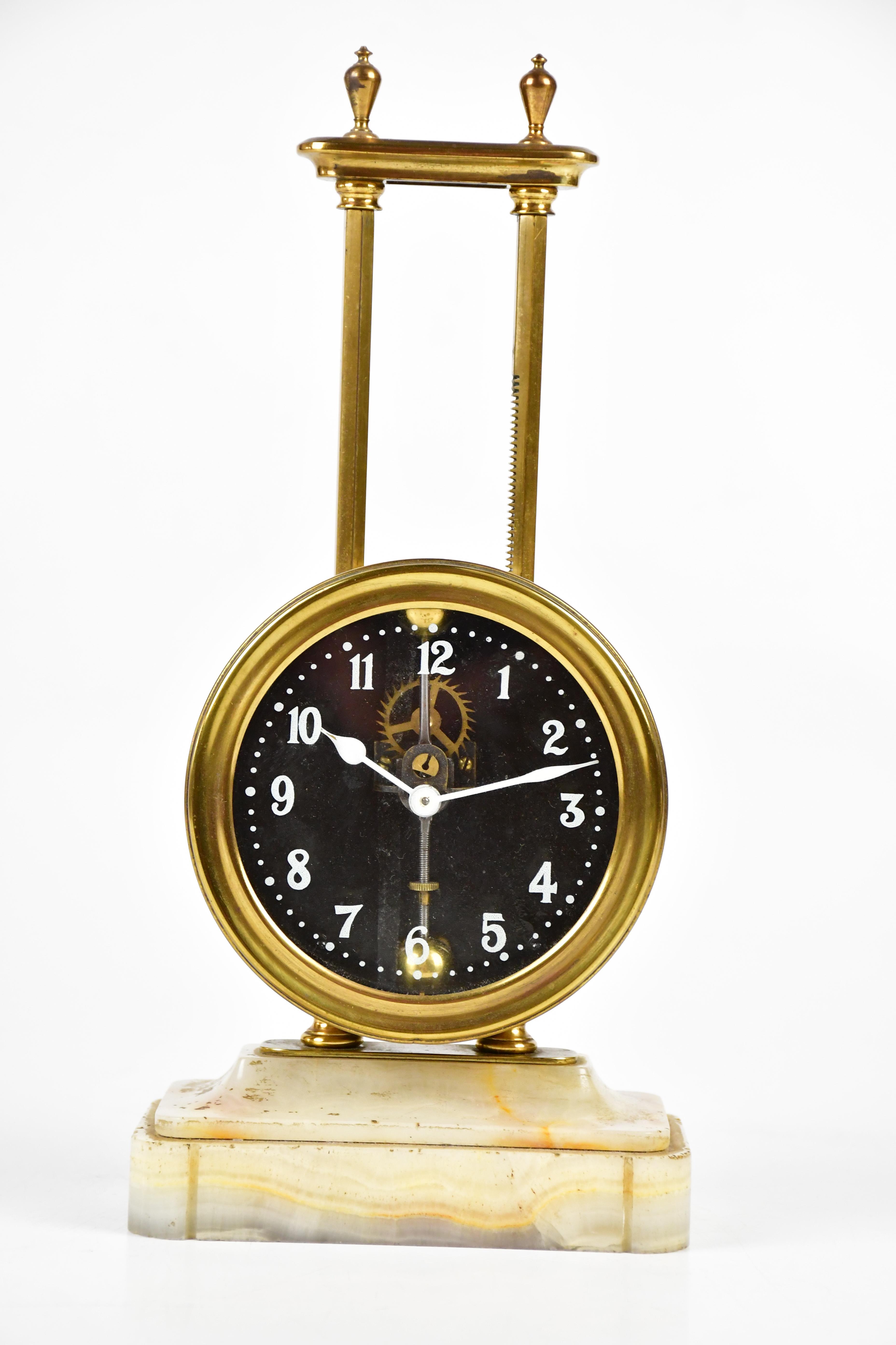 Lot 2113 - An early 20th century brass gravity clock,