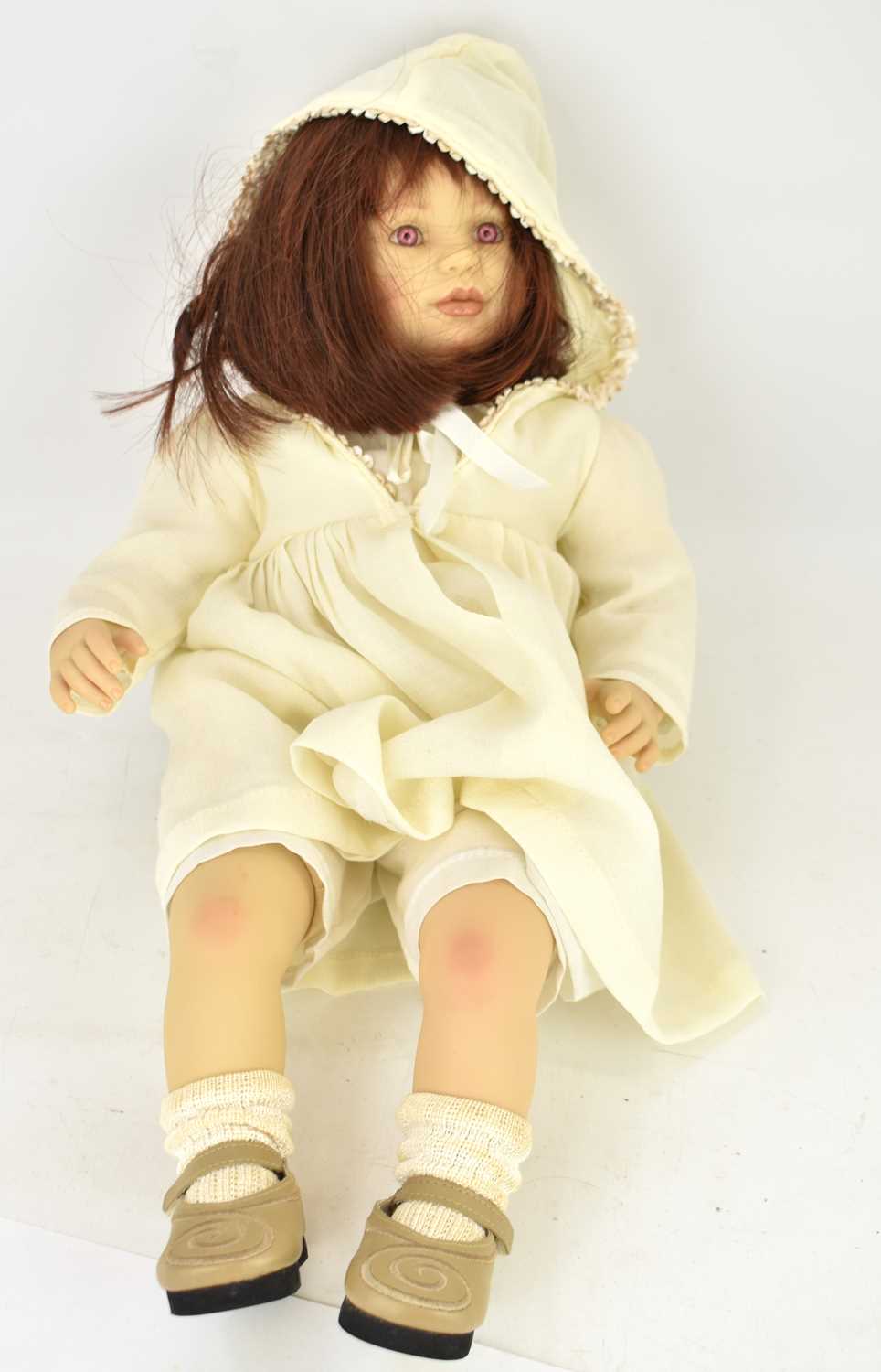 Lot 728 - A modern collectors' doll with cloth body,