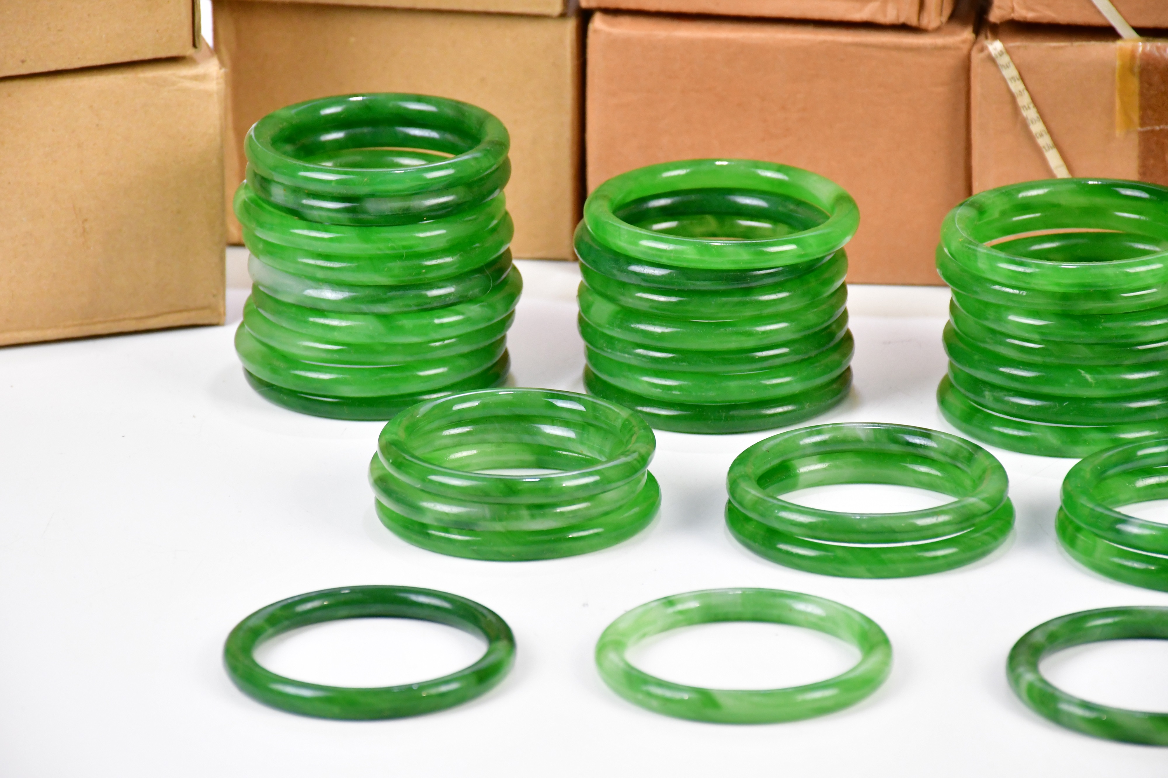 Lot 1273 - An extensive collection of jadeite bangles.