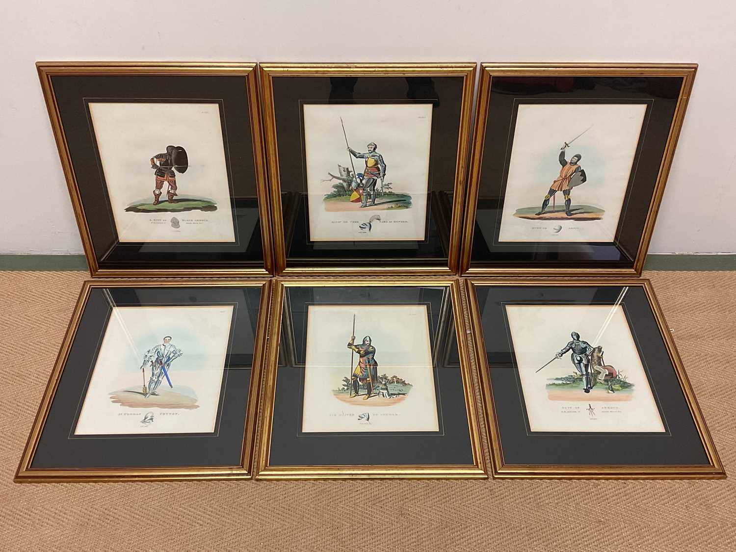 Lot 319 - Six coloured print plates depicting medieval