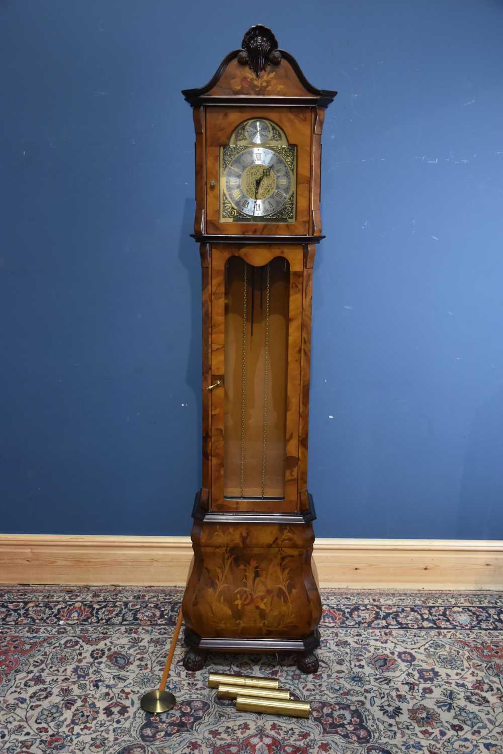 Lot 2012 - A reproduction inlaid walnut longcase clock