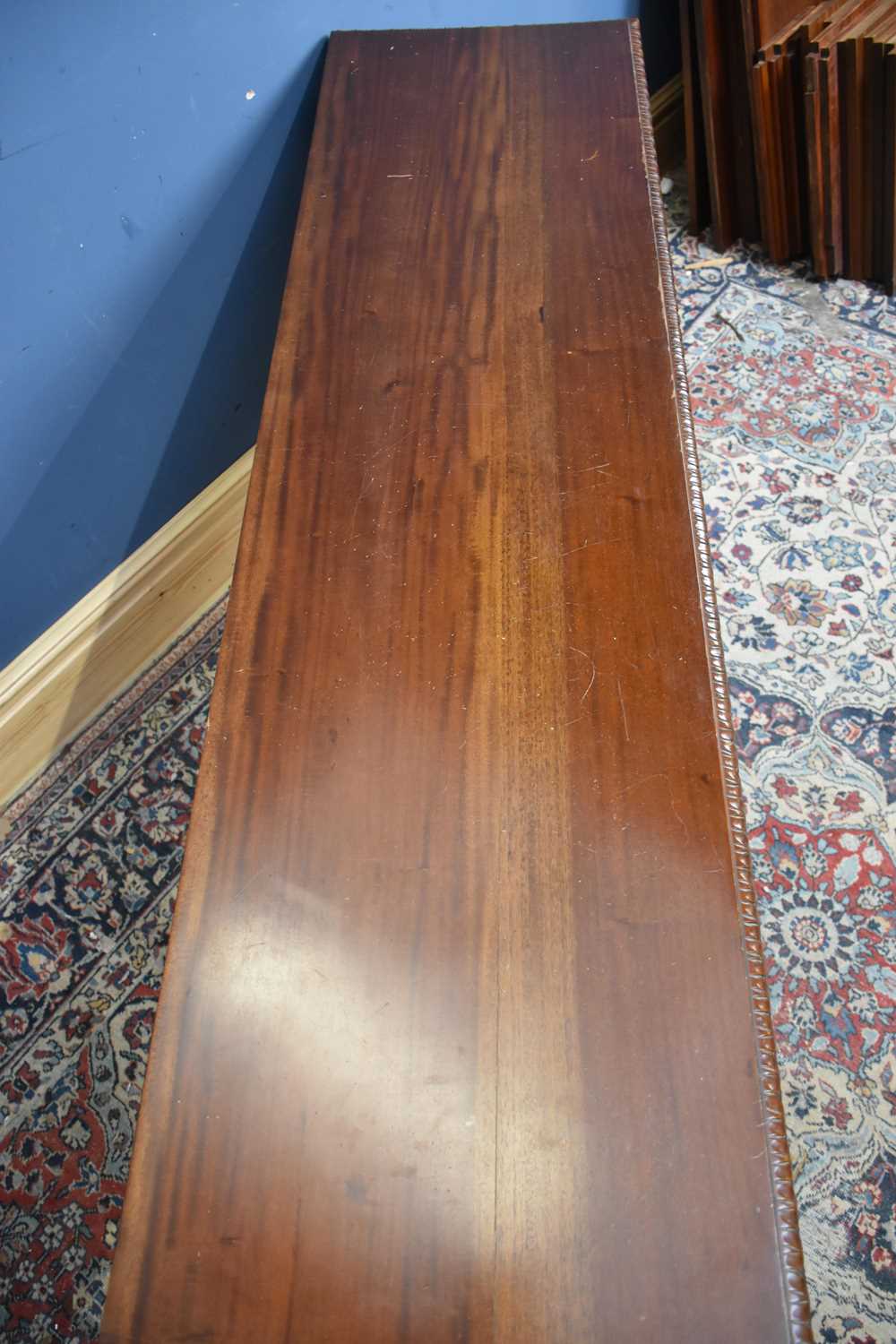 Lot 191 - A reproduction cherrywood console table with